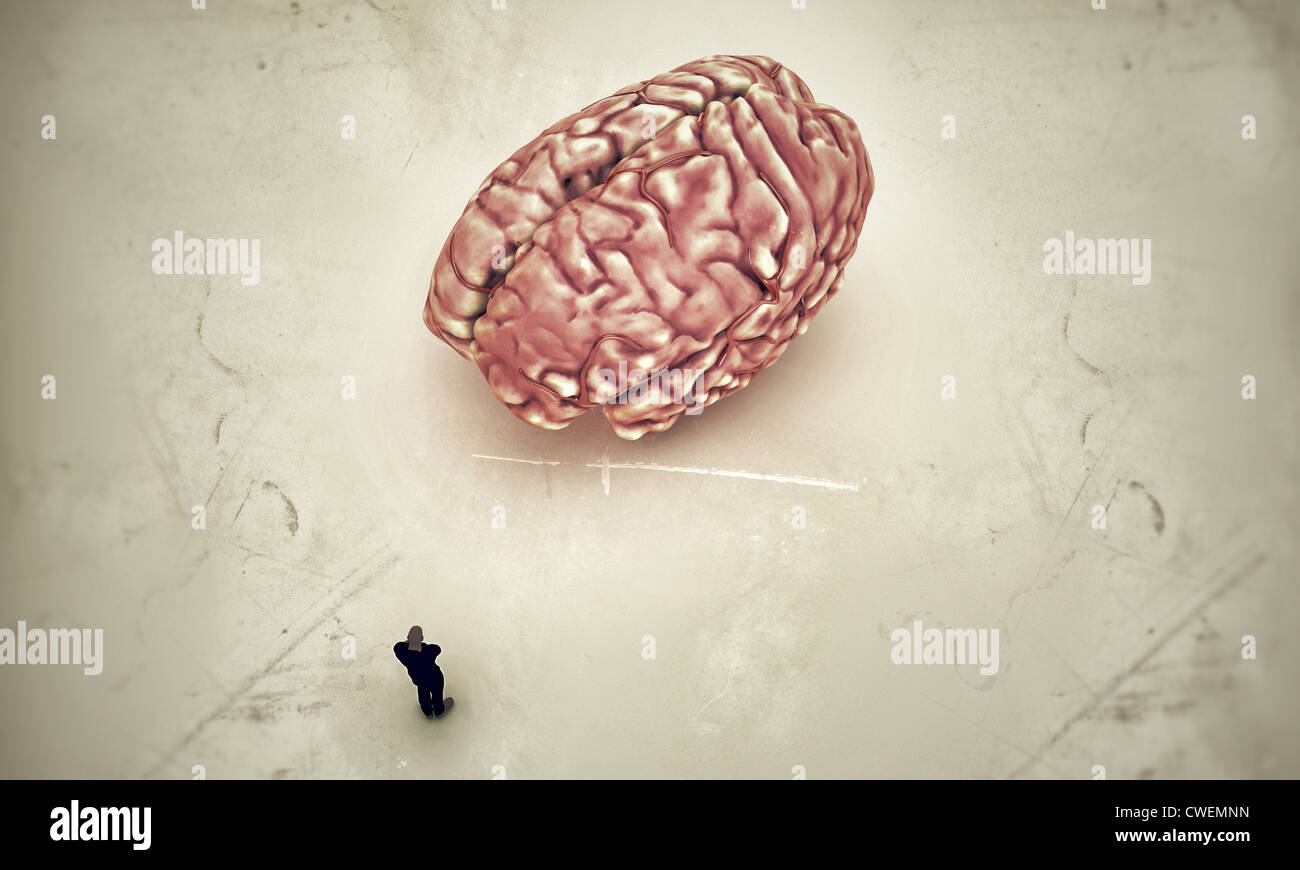 man in black thinking with a big brain drop on the floor Stock Photo ...