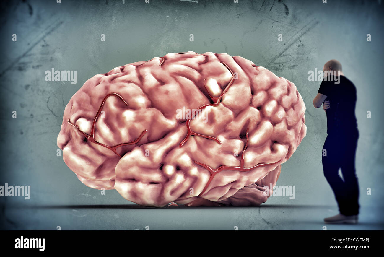 man in black thinking with a big brain drop on the floor Stock Photo ...