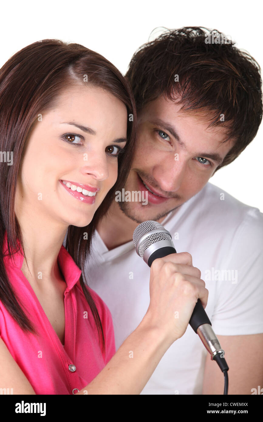 Couple singing together Stock Photo - Alamy