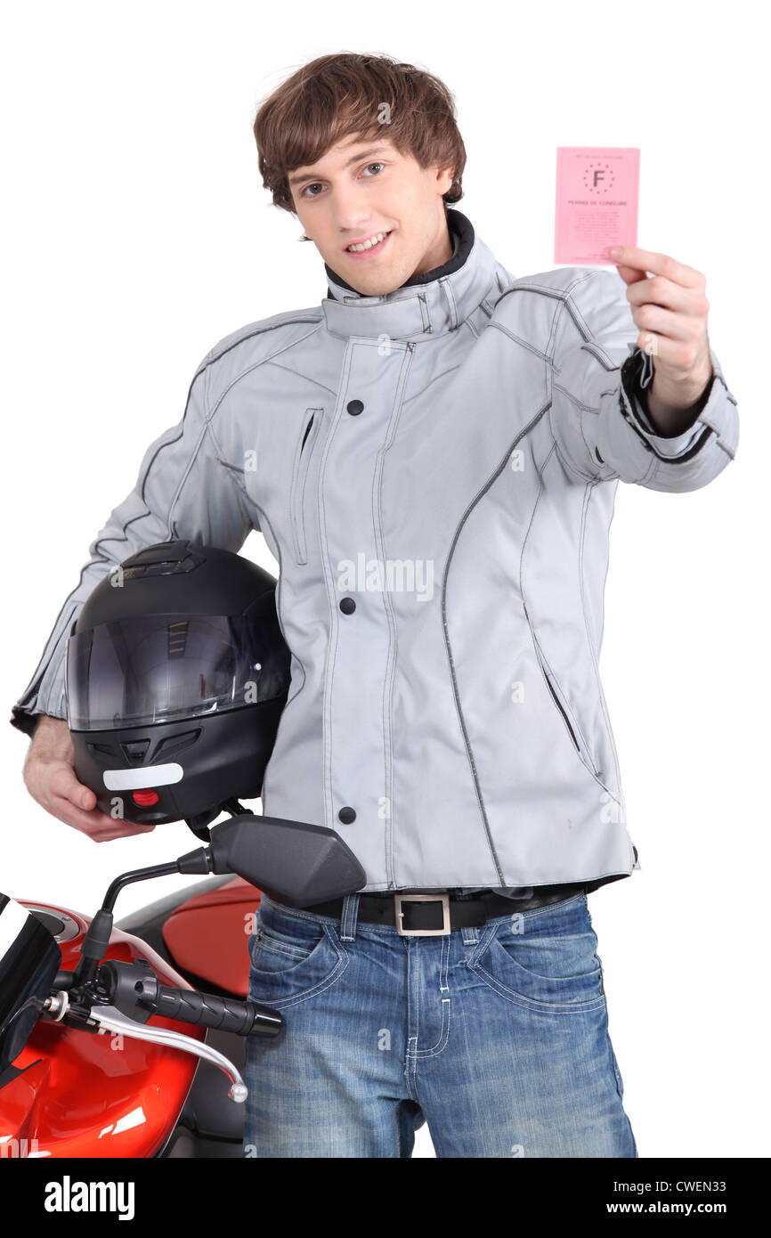 young man with driving license Stock Photo - Alamy