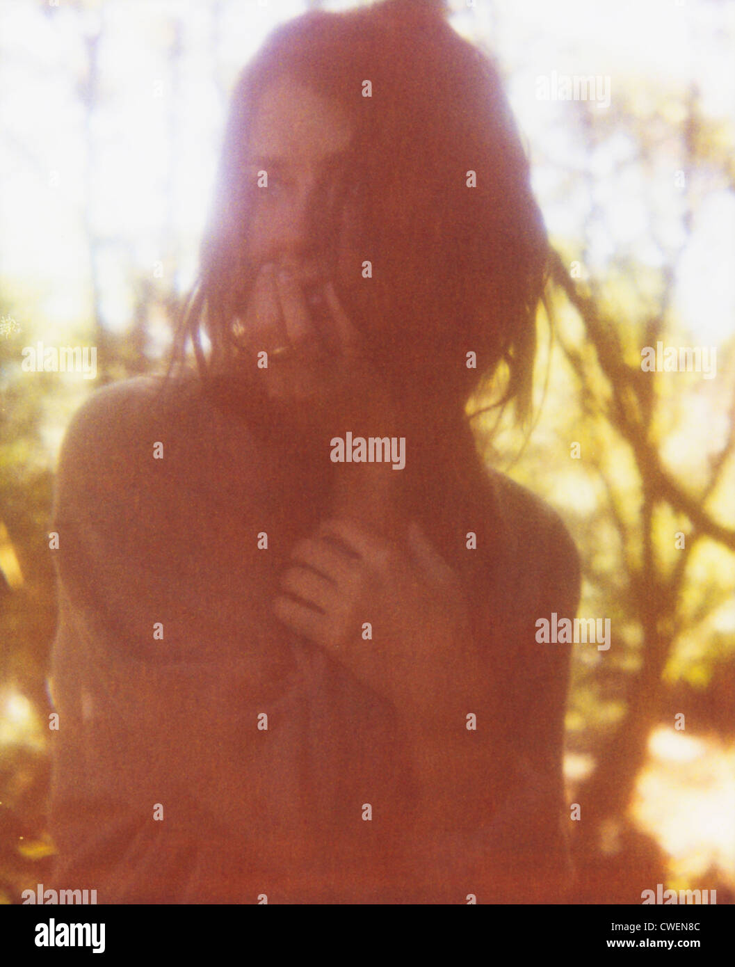 Girl in shadow with woods Stock Photo - Alamy