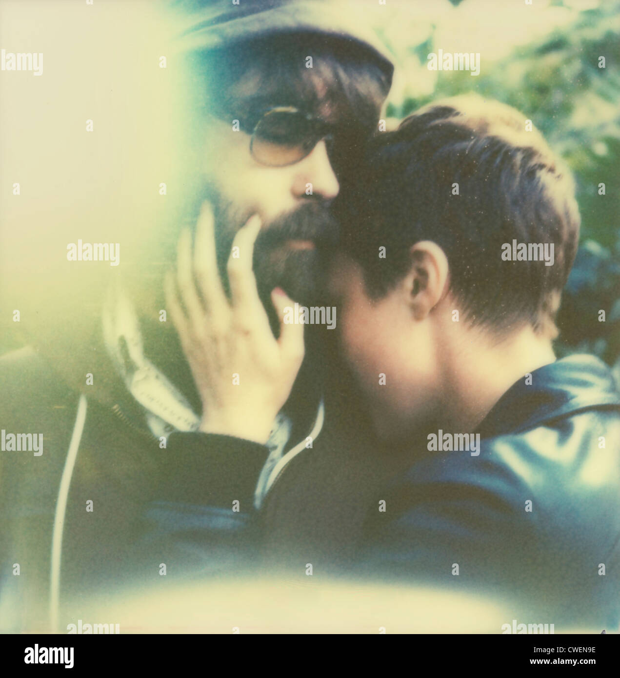 Couple touching one another Stock Photo - Alamy