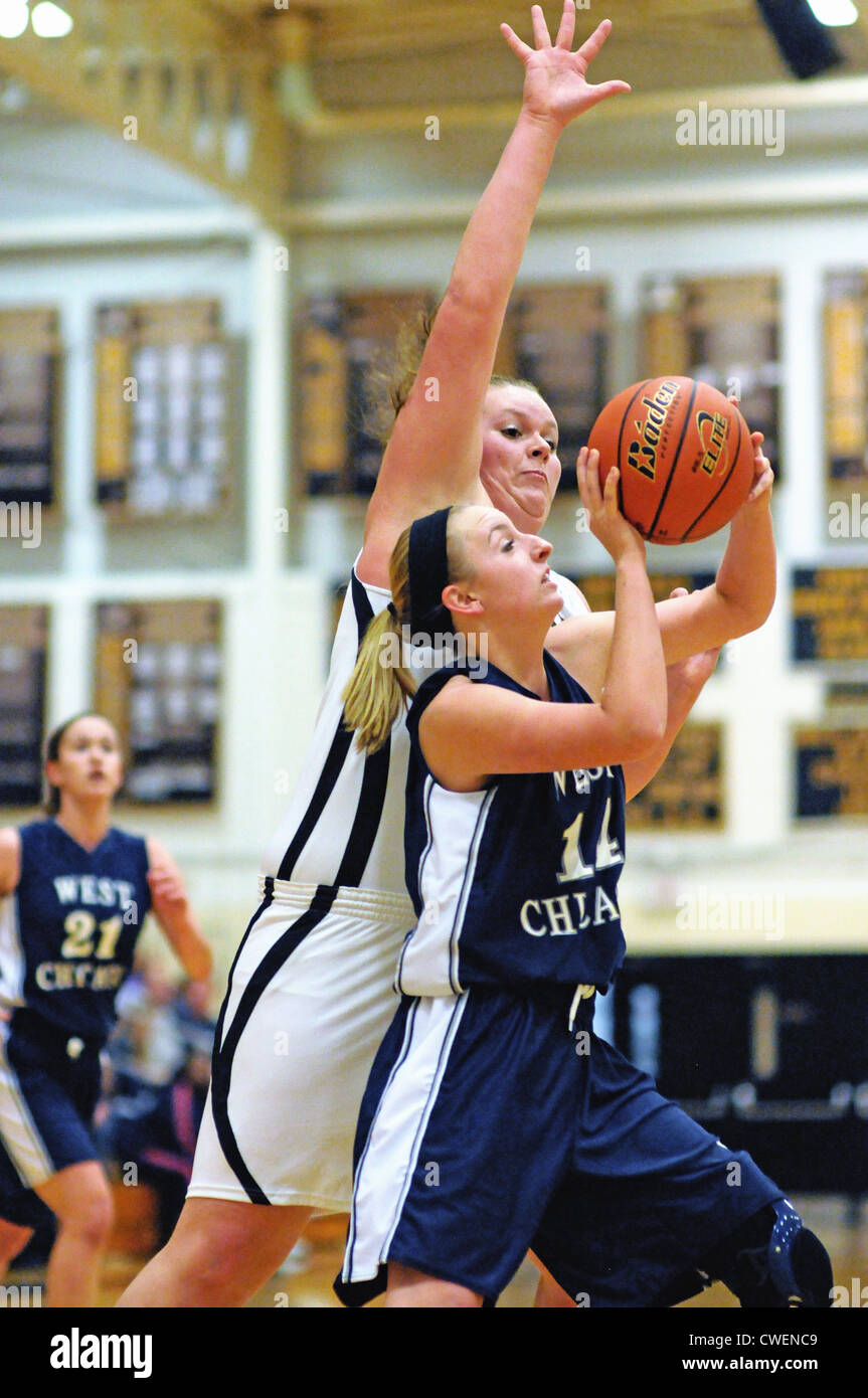 Basketball Player attempts to block a shot. USA Stock Photo - Alamy