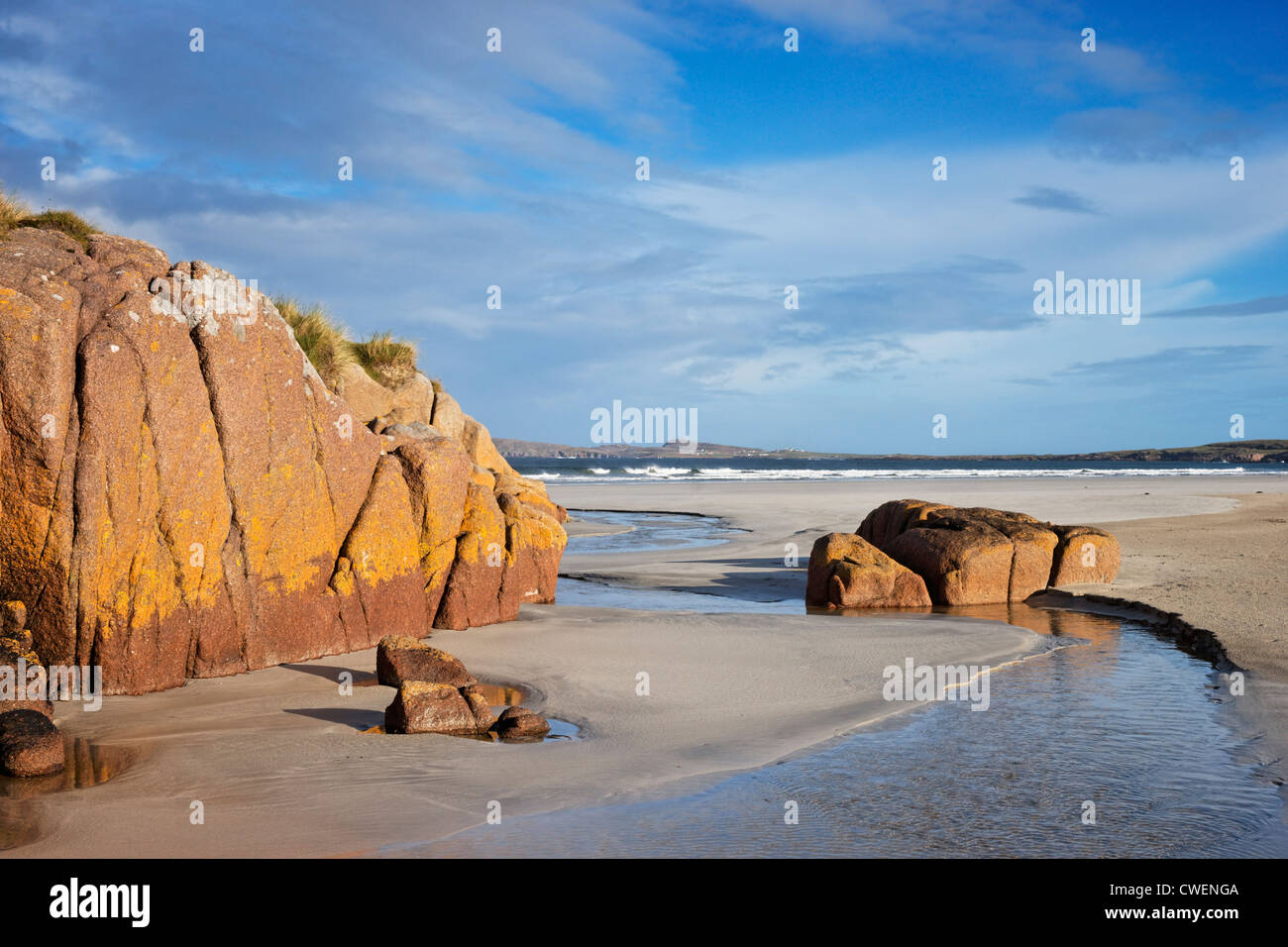 Rocks and stream on the Carrickfin beach, County Donegal, Ulster ...