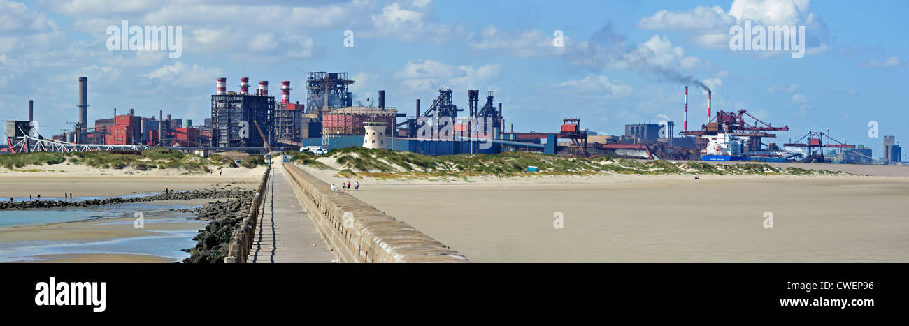 View over heavy industry seen from the beach at Dunkirk / Dunkerque ...