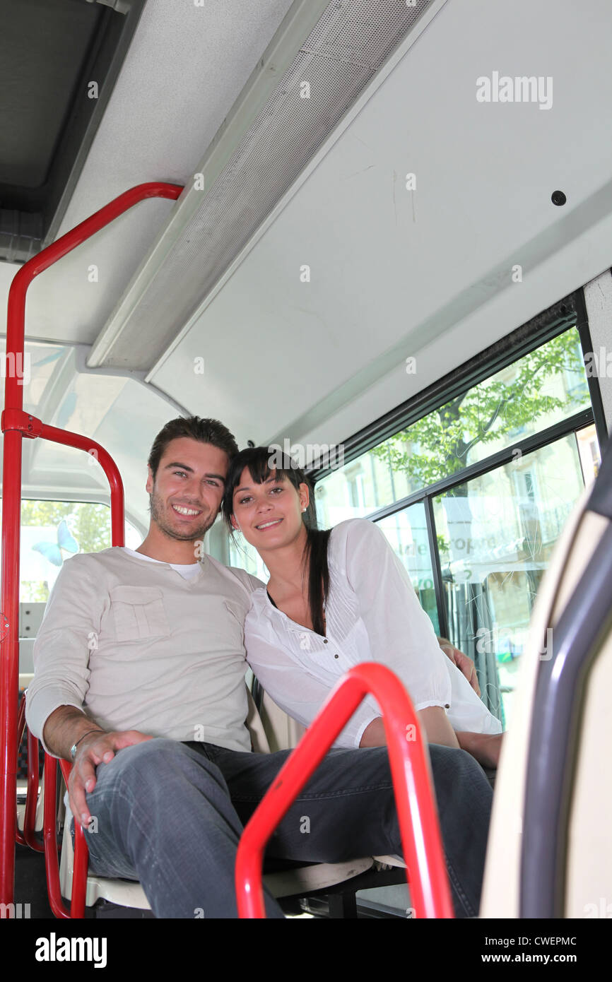 Student couple at bus stop hi-res stock photography and images - Alamy