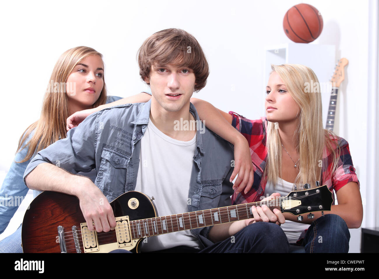 Teenagers playing the guitar Stock Photo - Alamy