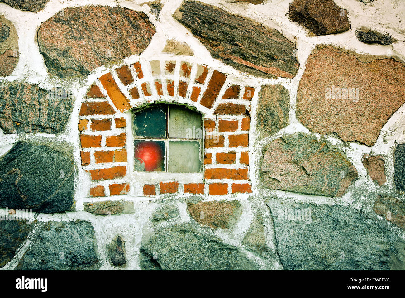 Small window in a stone wall of an old barn Stock Photo - Alamy