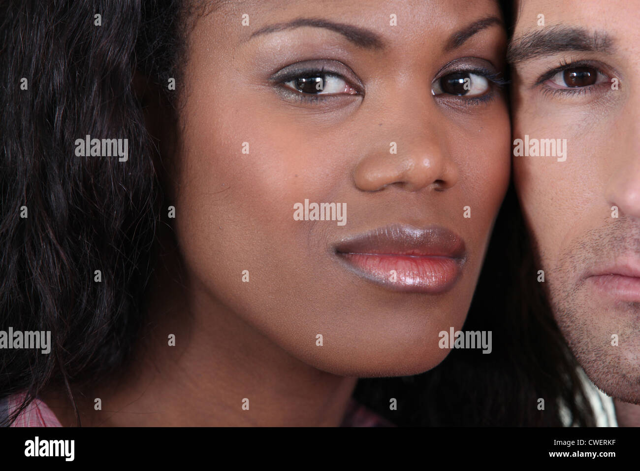 Mixed couple stood together Stock Photo - Alamy