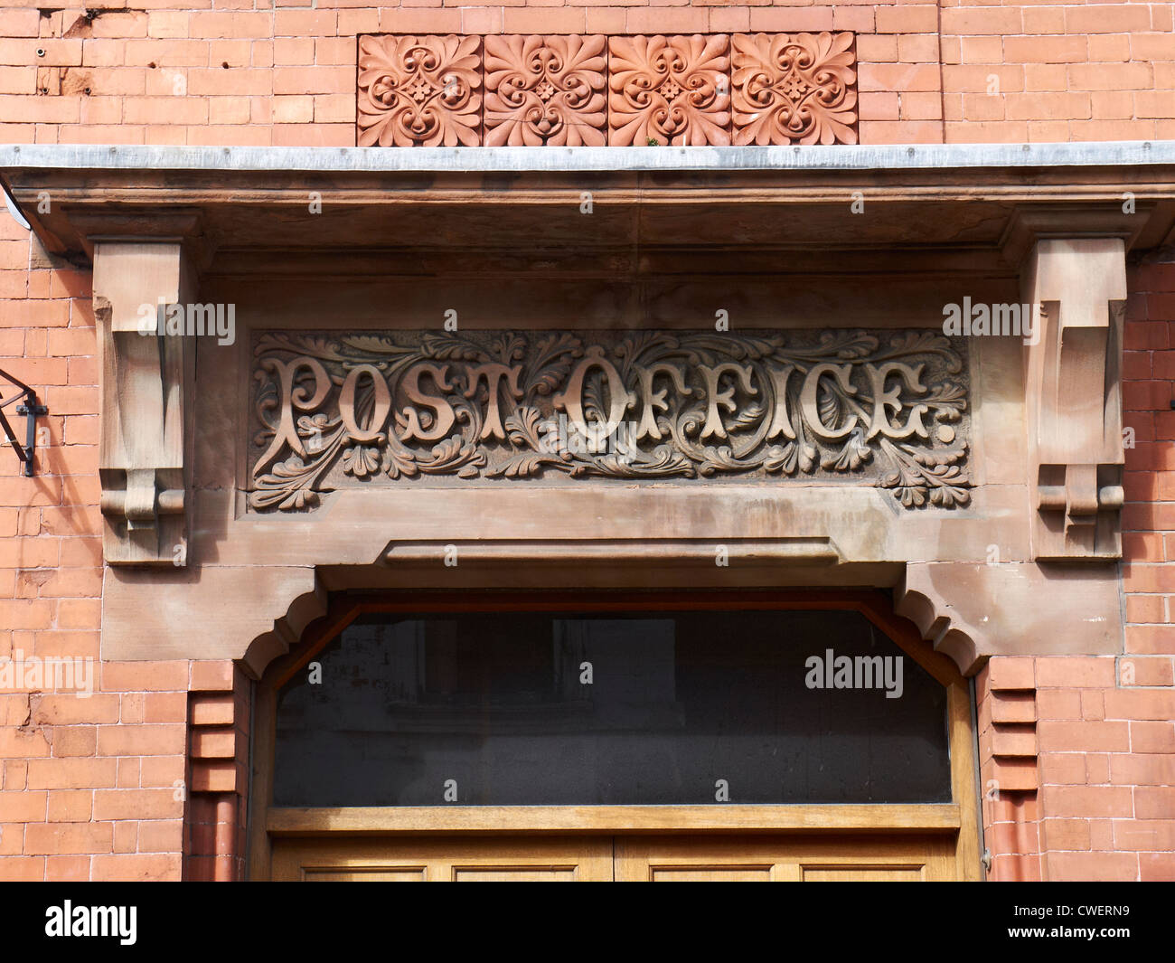 Post office sign above entrance of The Post House in Congleton Cheshire ...