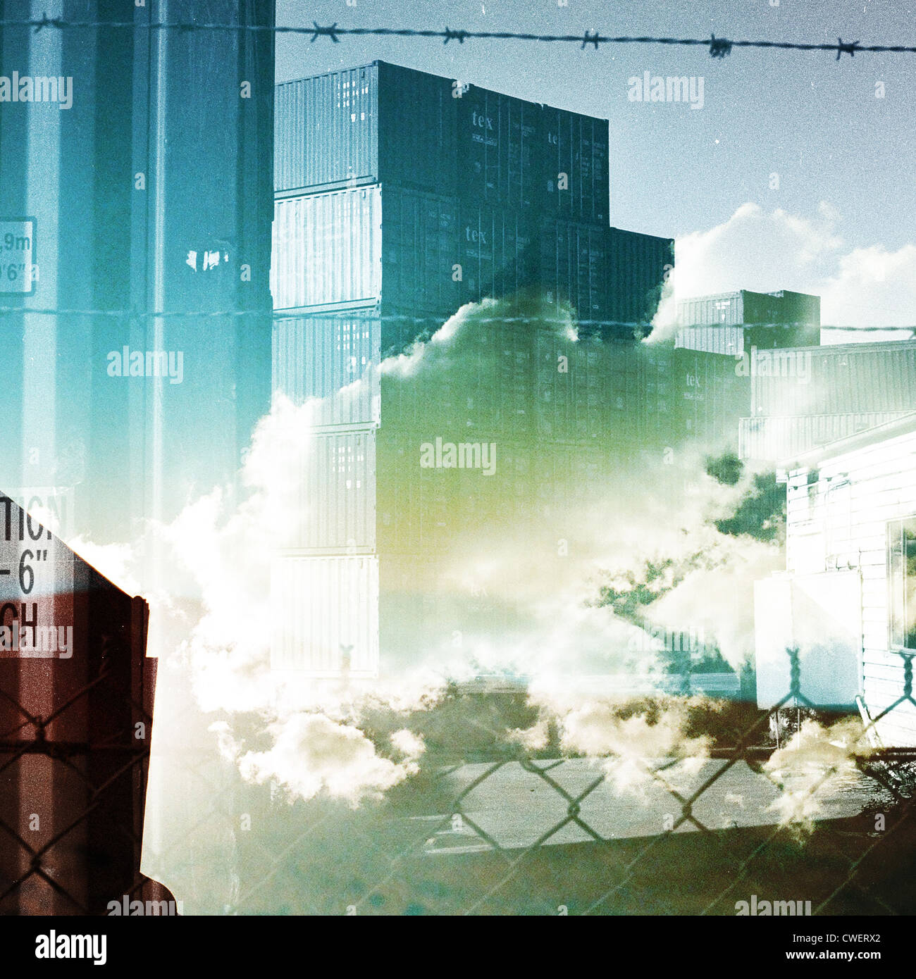 Double exposed shipping containers, chicken wire, clouds Stock Photo ...