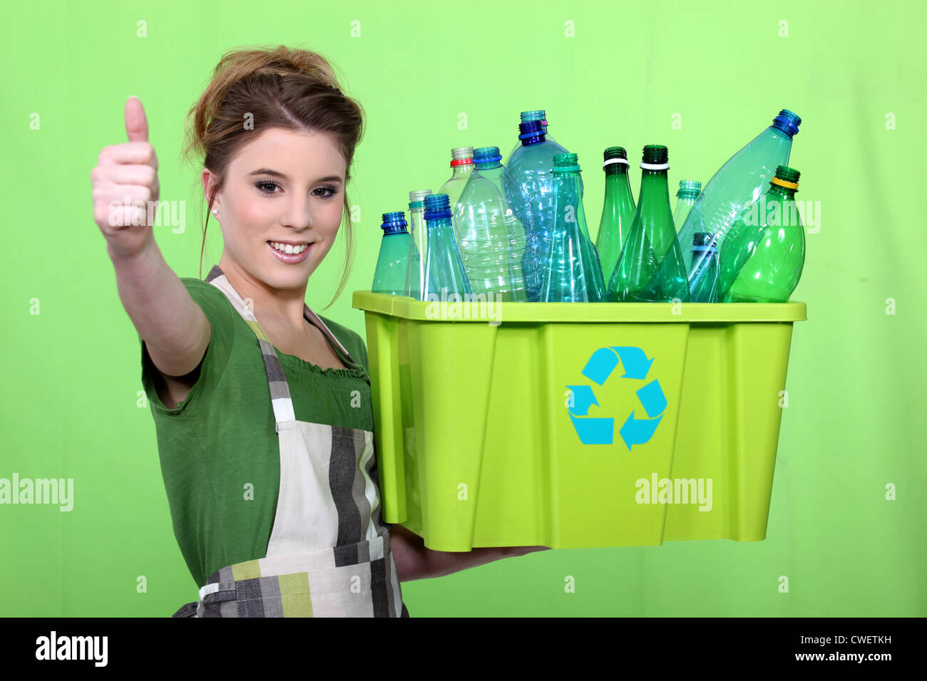 woman recycling plastic bottles Stock Photo - Alamy