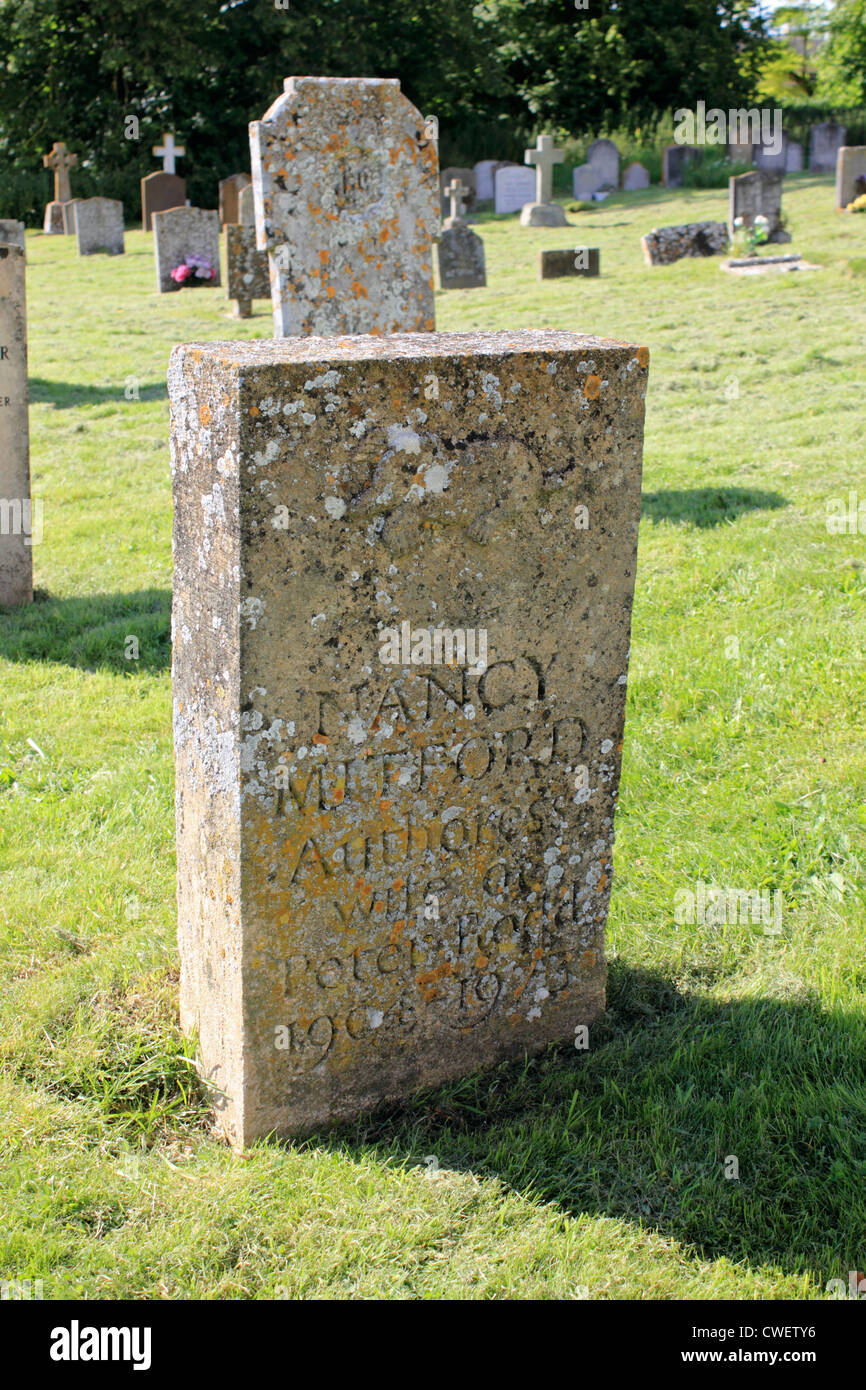 The grave stone of Nancy Mitford at Saint Mary the Virgin parish church Swinbrook Oxfordshire ...