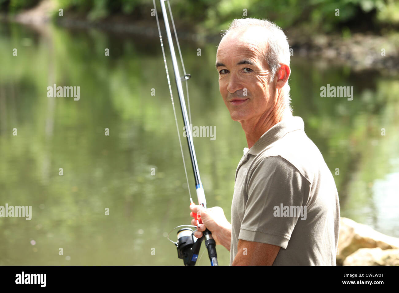 Solo shore fisherman hi-res stock photography and images - Alamy