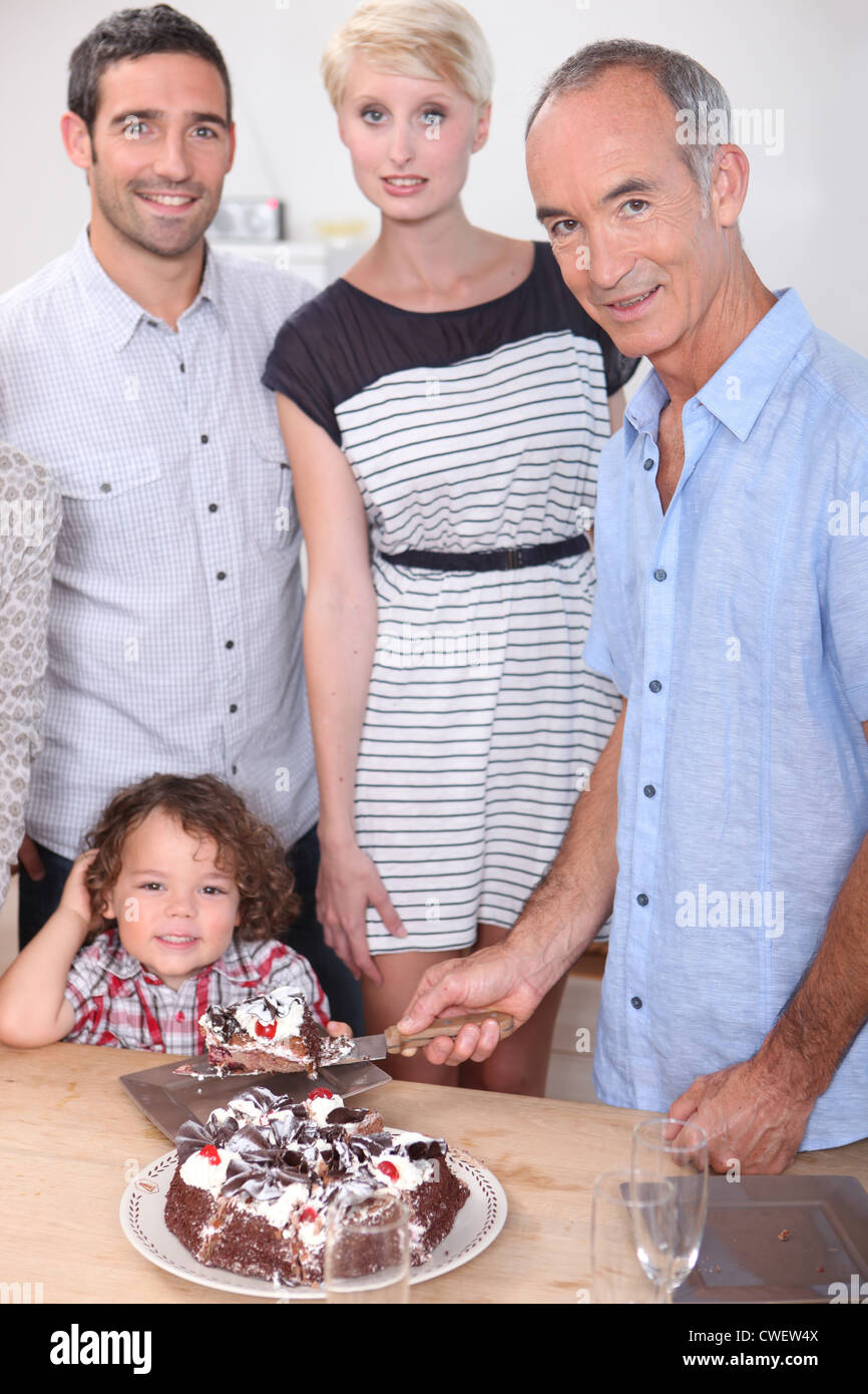 Father son cutting birthday cake hi-res stock photography and images ...