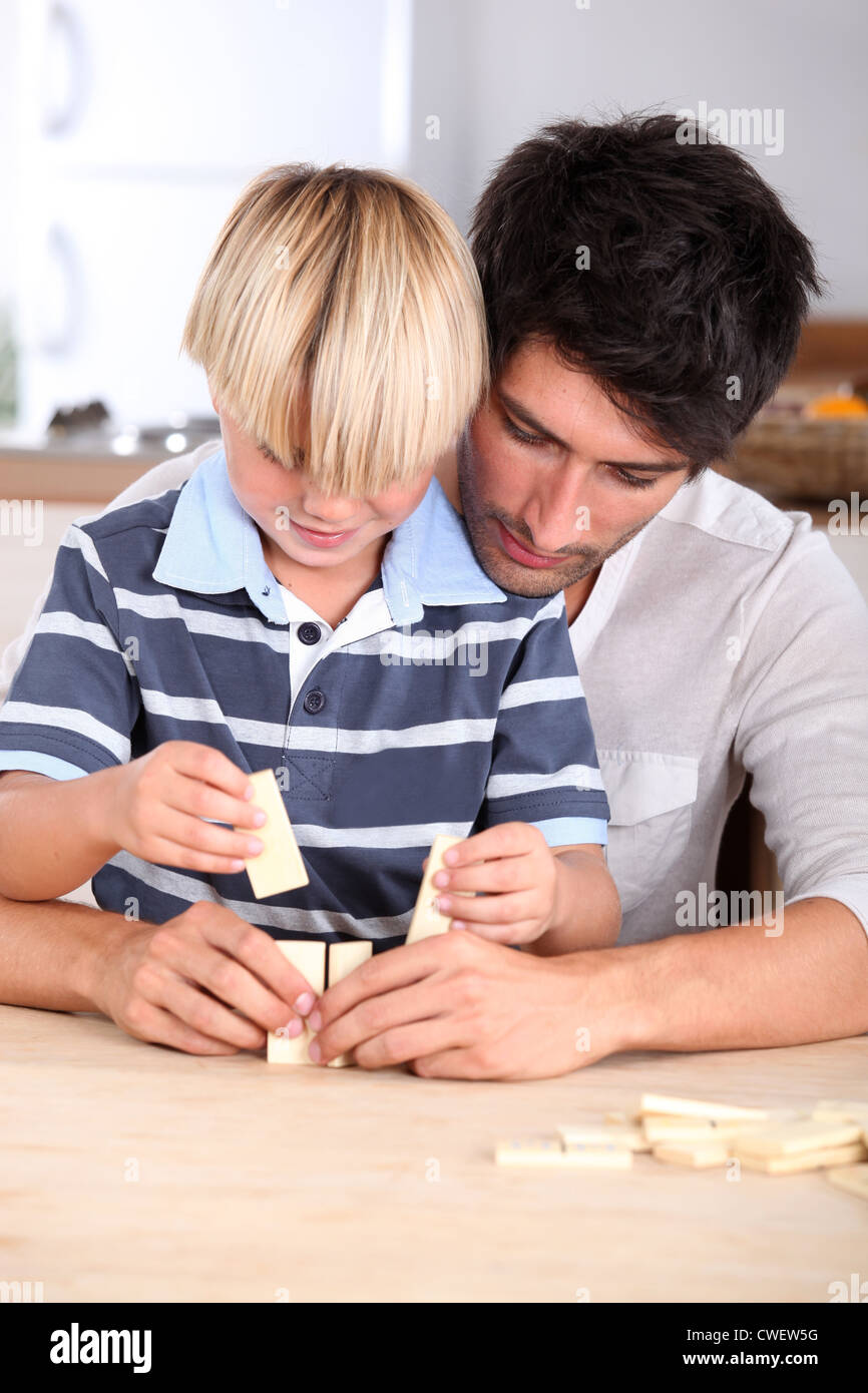 father and son playing together Stock Photo - Alamy