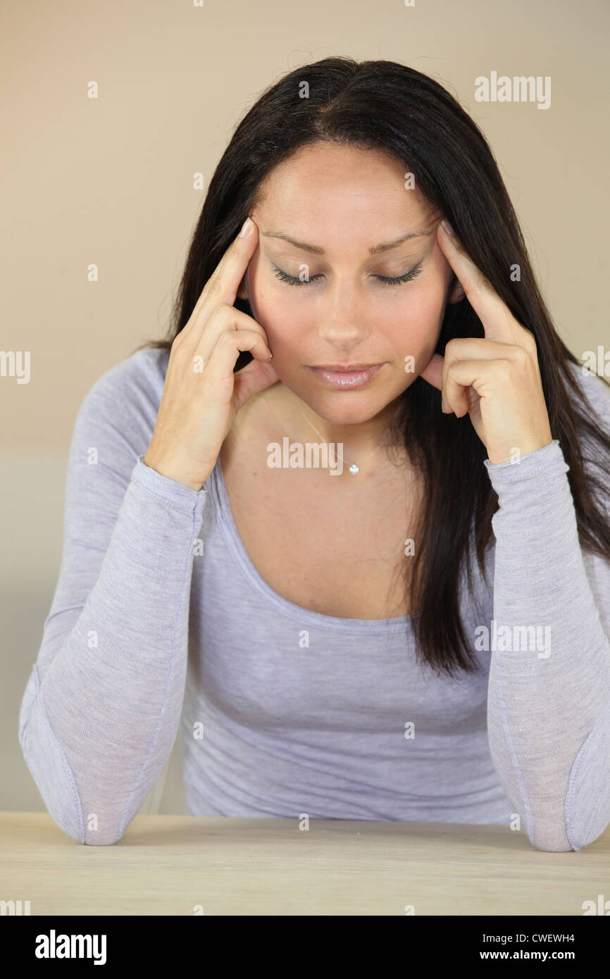 Beautiful woman concentrating Stock Photo - Alamy