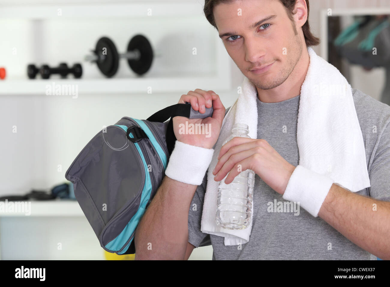 Man with a sports bag Stock Photo - Alamy