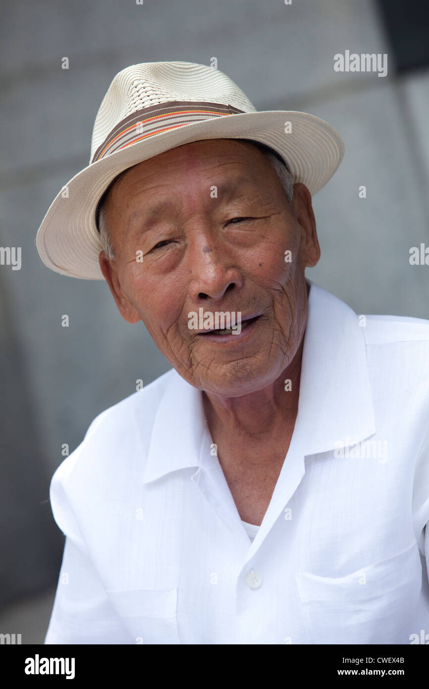 An elderly Korean man with a hat in a park in Korea Stock Photo - Alamy
