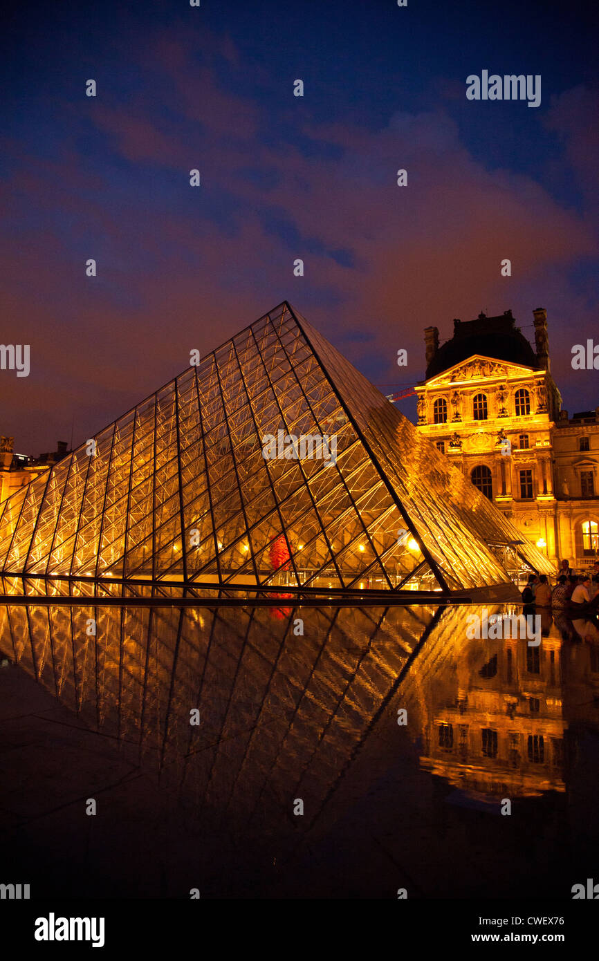 Glass pyramid in Cour Napoleon with the Louvre in the background in ...