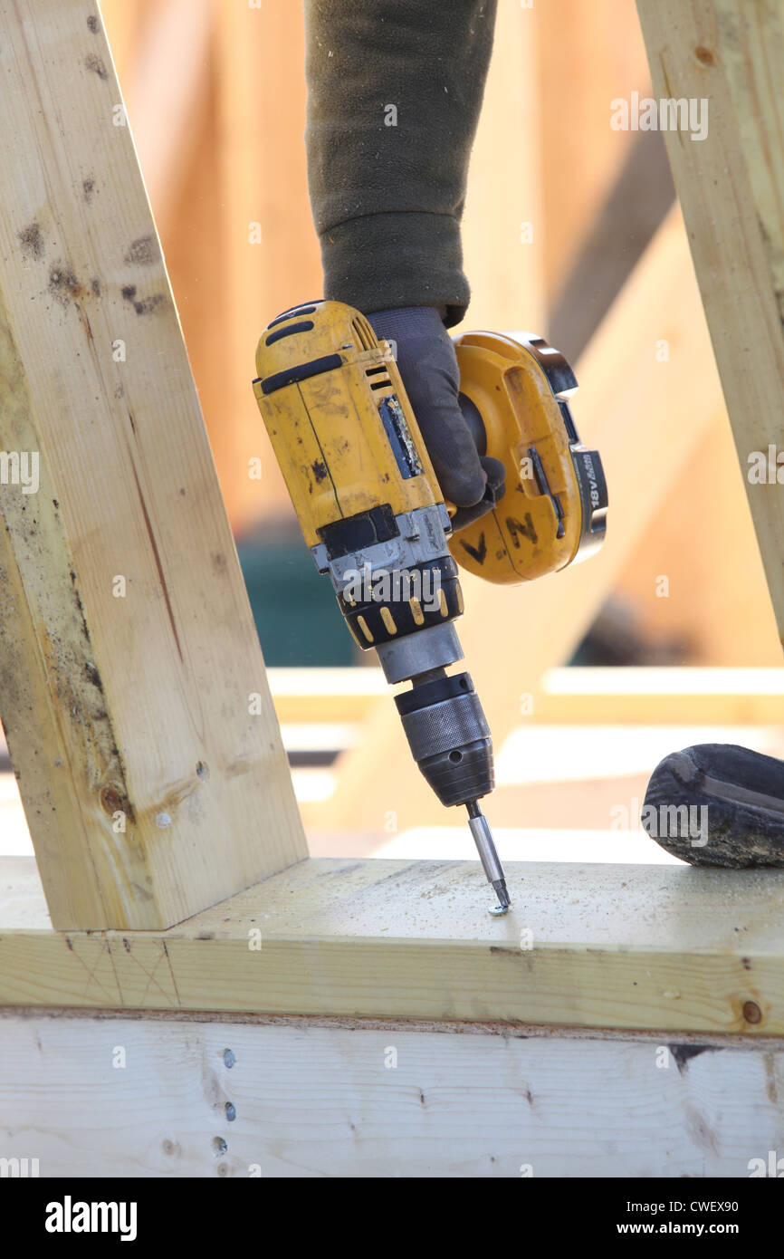 Man using a cordless screwdriver Stock Photo - Alamy