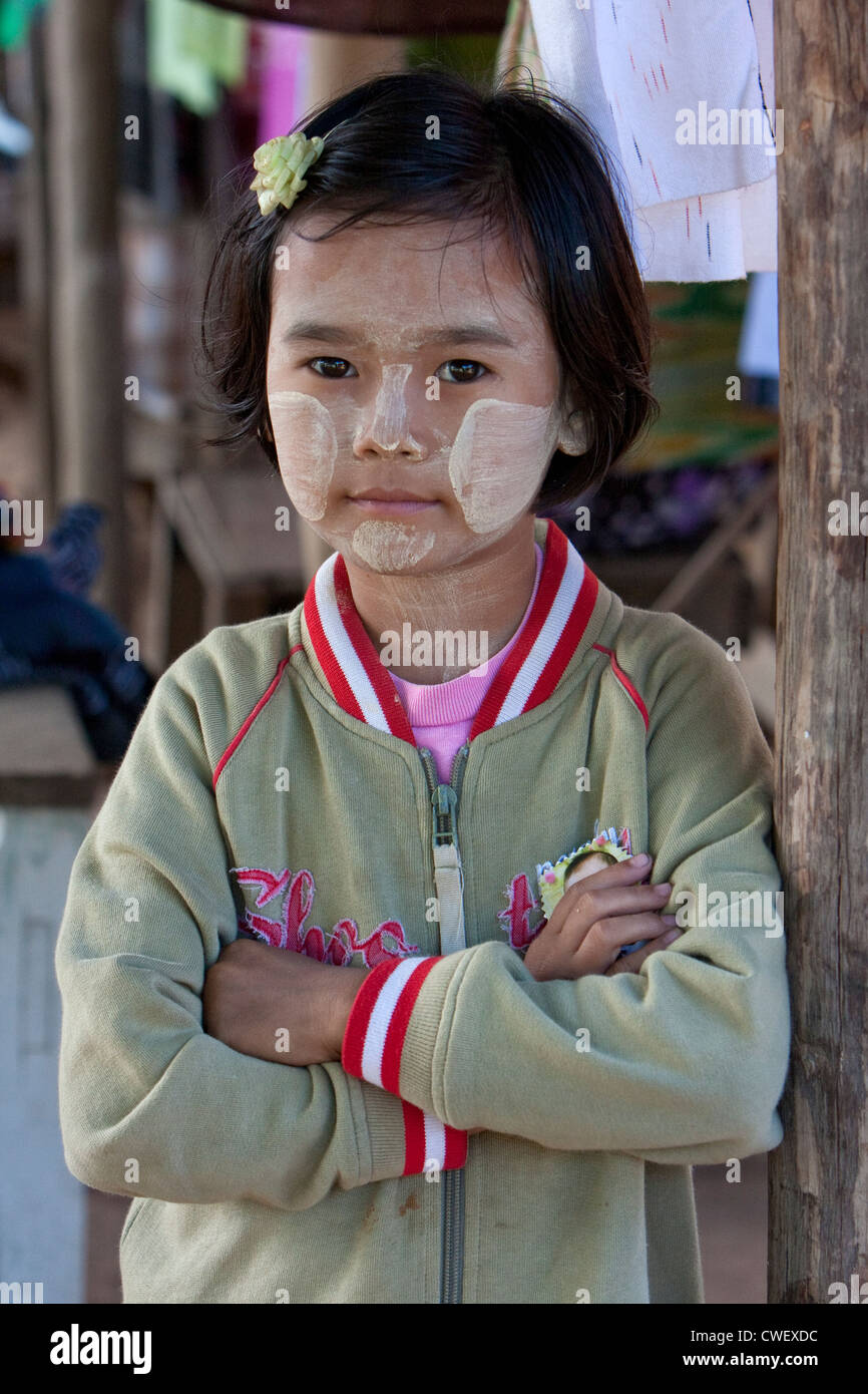 Myanmar, Burma. Mingun, near Mandalay. Young Burmese Girl. She is ...