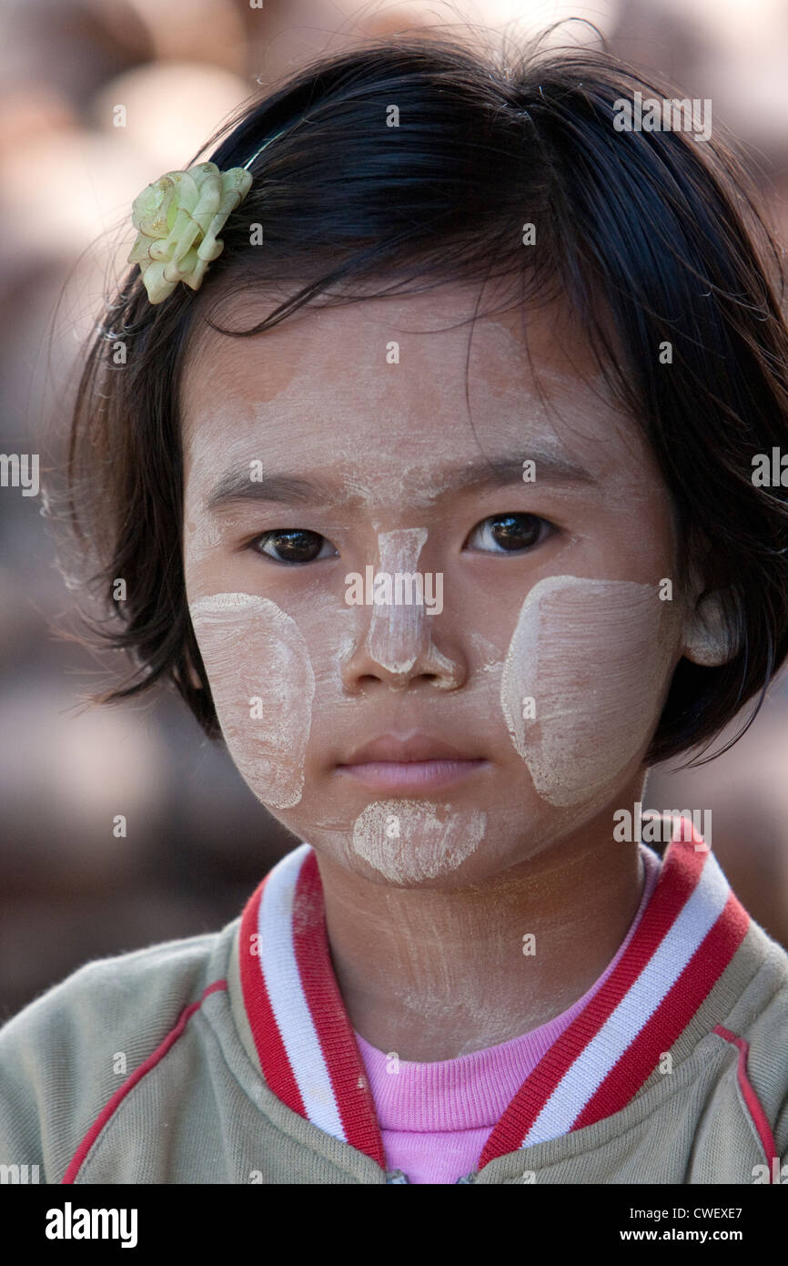 Myanmar, Burma. Mingun, near Mandalay. Young Burmese Girl. She is ...