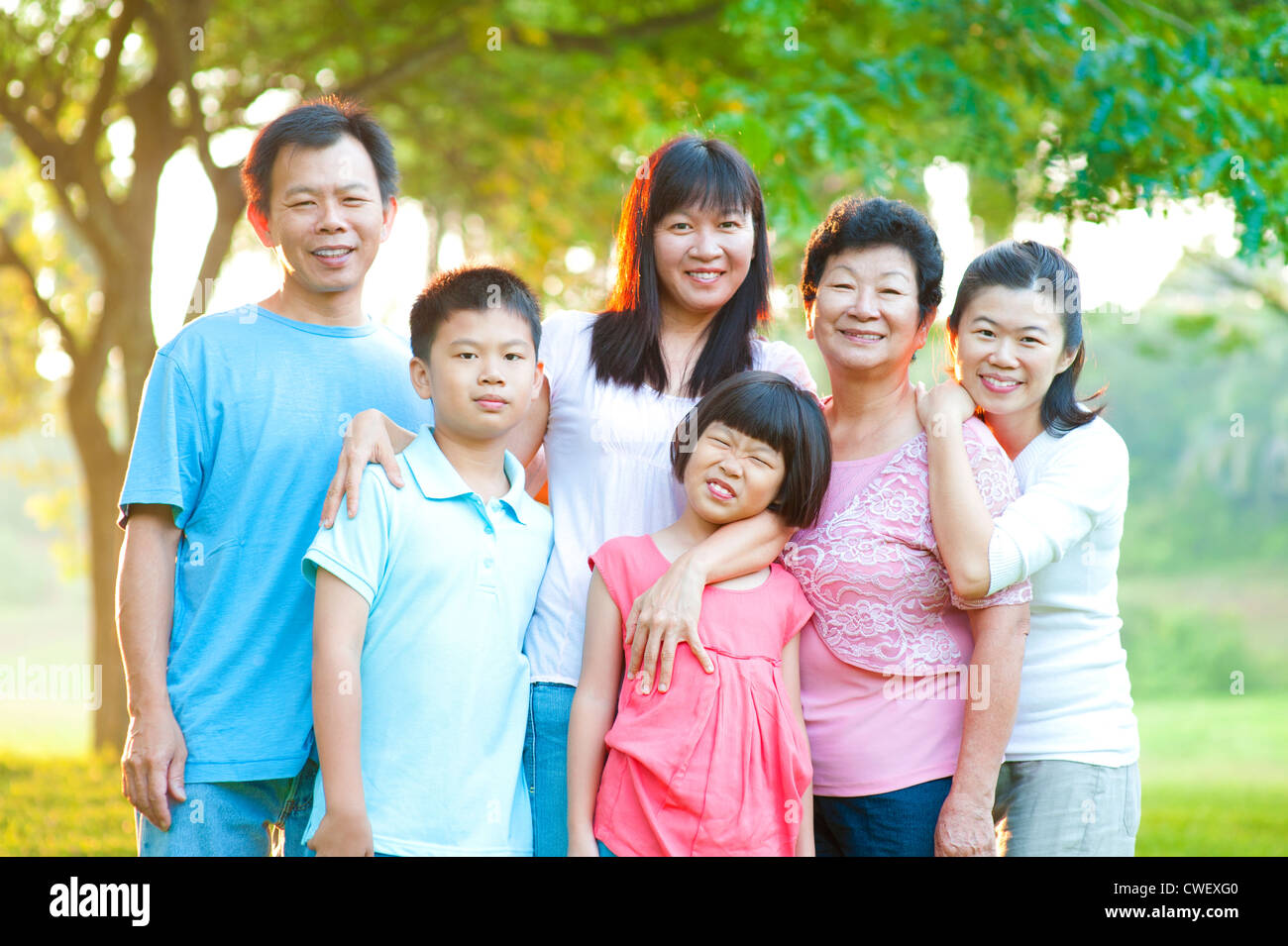 Asian family having a great time at outdoor park Stock Photo - Alamy