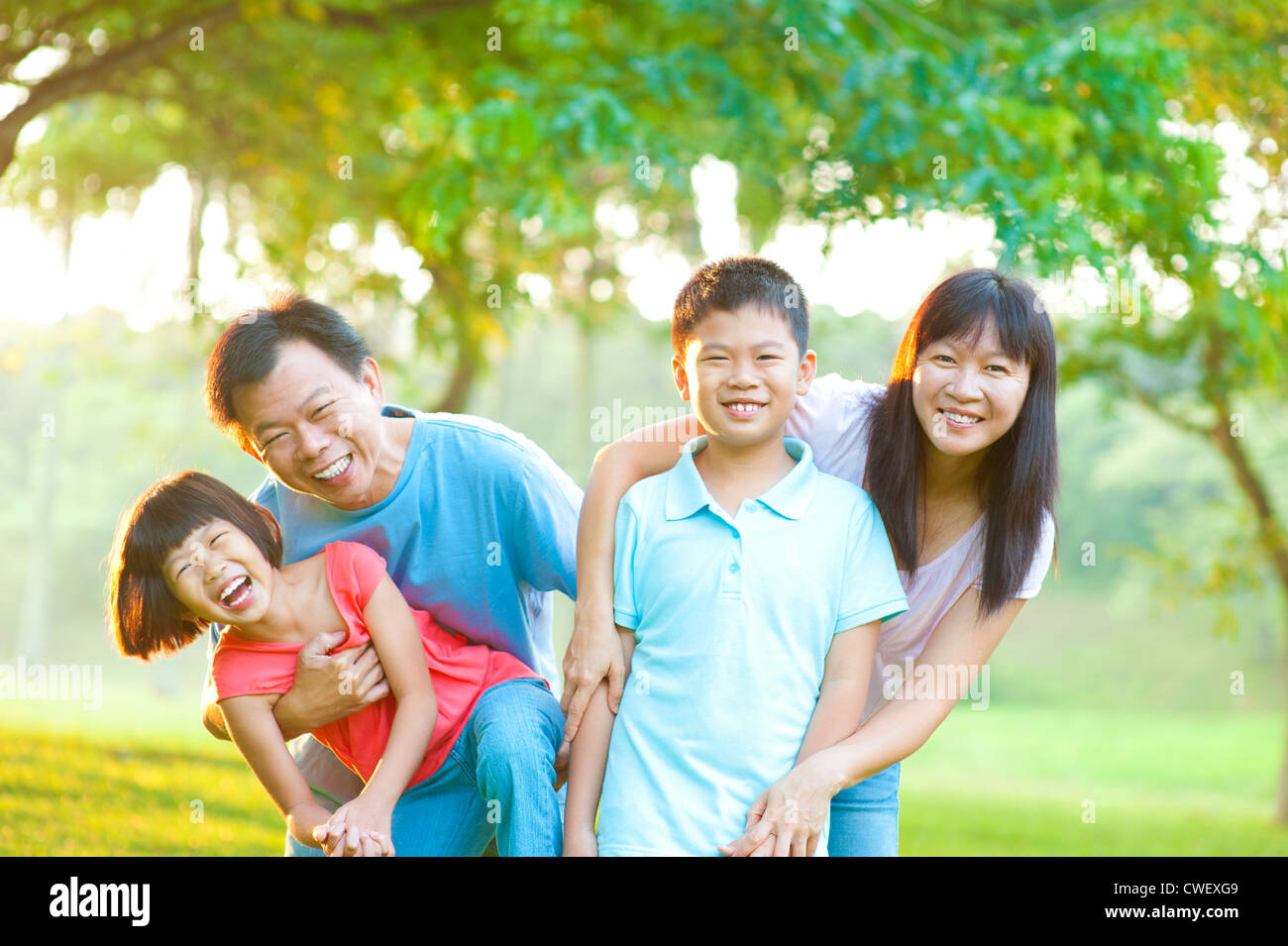 Happy Asian Family Outdoor Lifestyle Stock Photo - Alamy