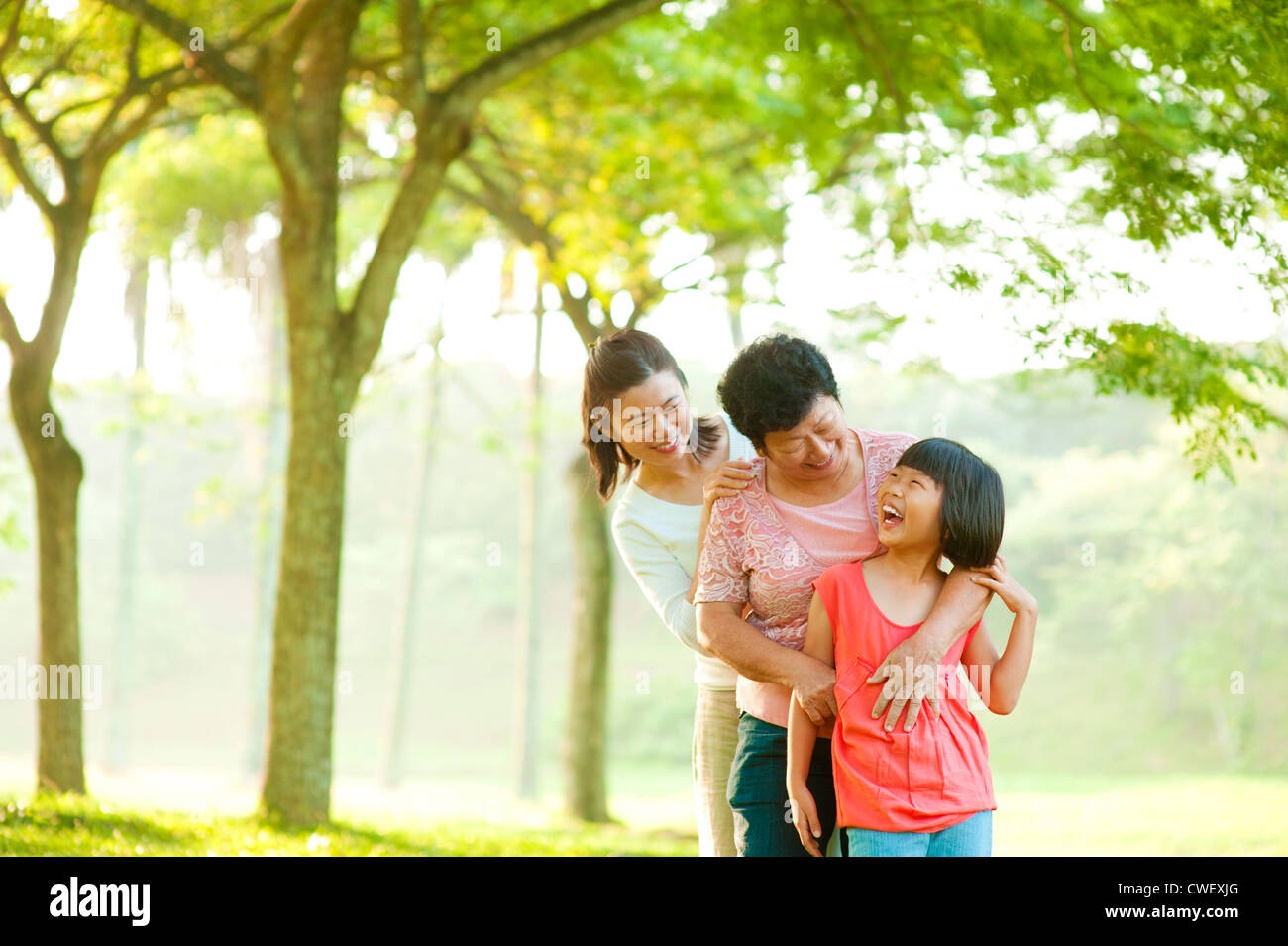 Three generations family having fun at outdoor Stock Photo - Alamy