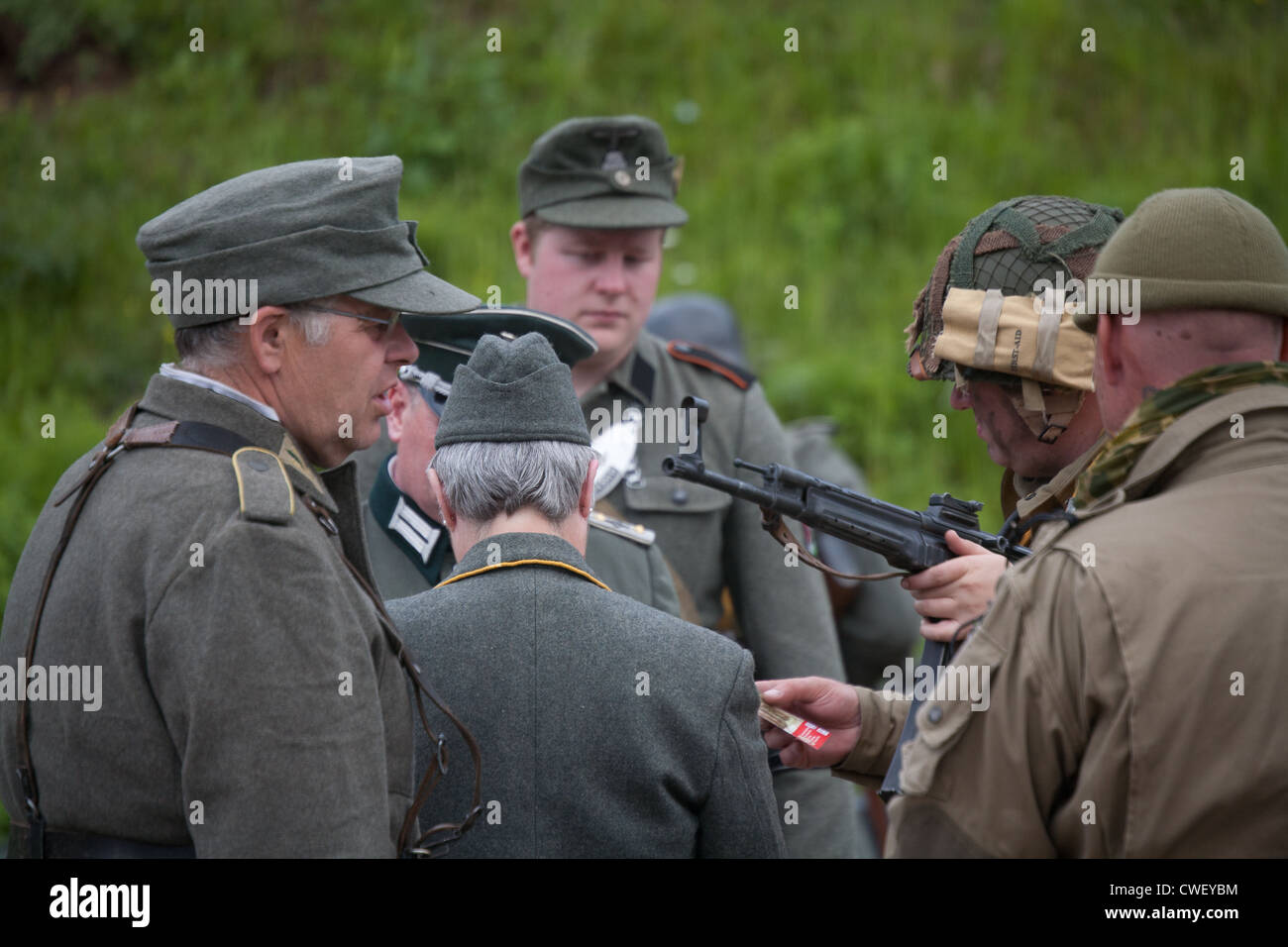 Axis and German troops talking Stock Photo - Alamy