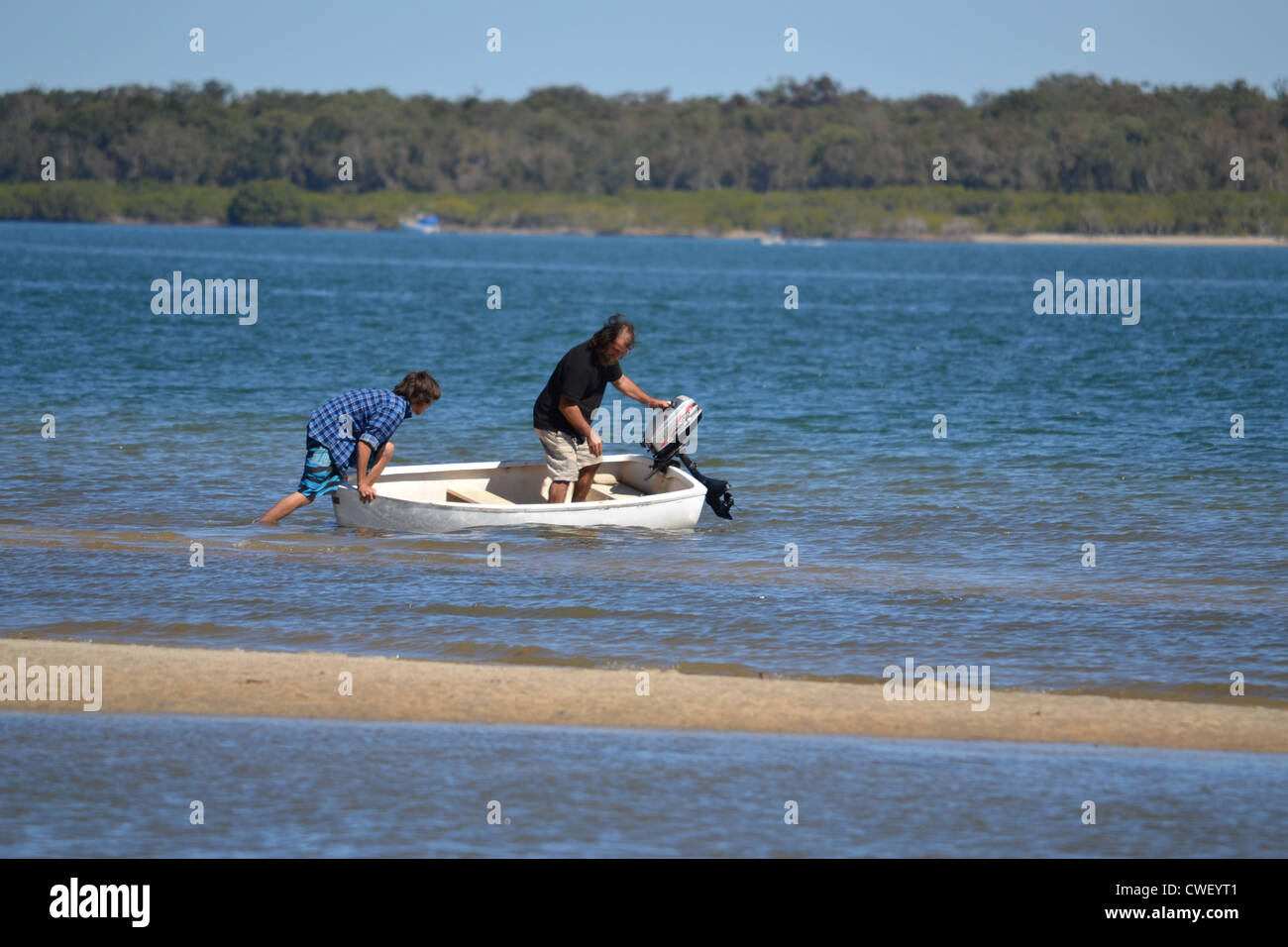 Boy motor boating hi-res stock photography and images - Alamy