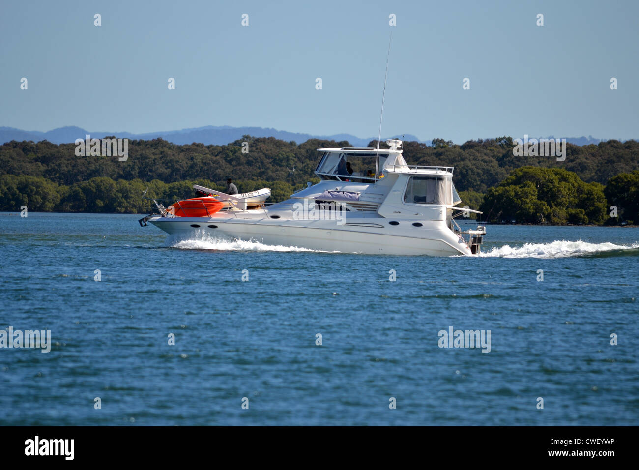 A yacht cruising along Stock Photo - Alamy