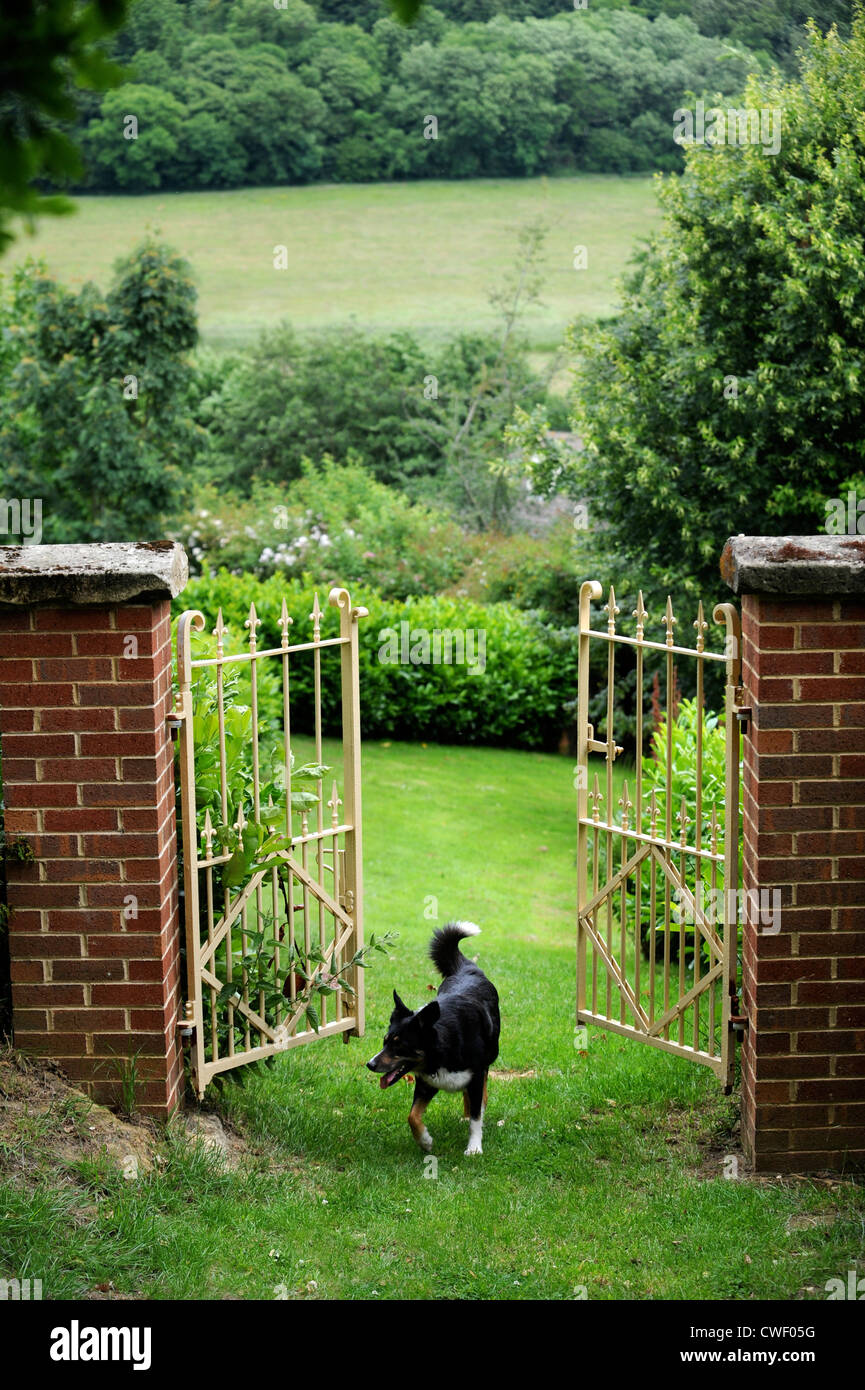 A gateway from a garden into open countryside England UK Stock Photo ...