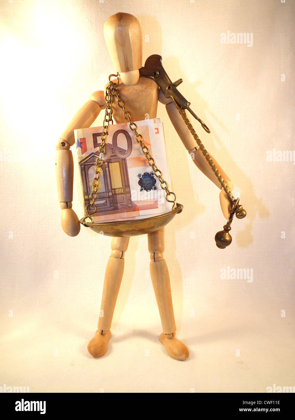 The real weight of money with dummy. Reflex of life Stock Photo - Alamy