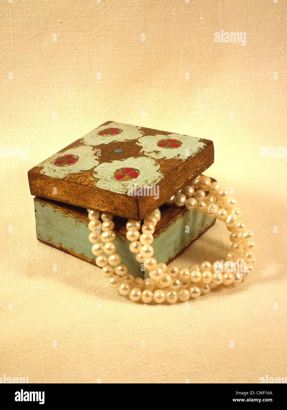 White pearl necklace in an old wooden box Stock Photo - Alamy