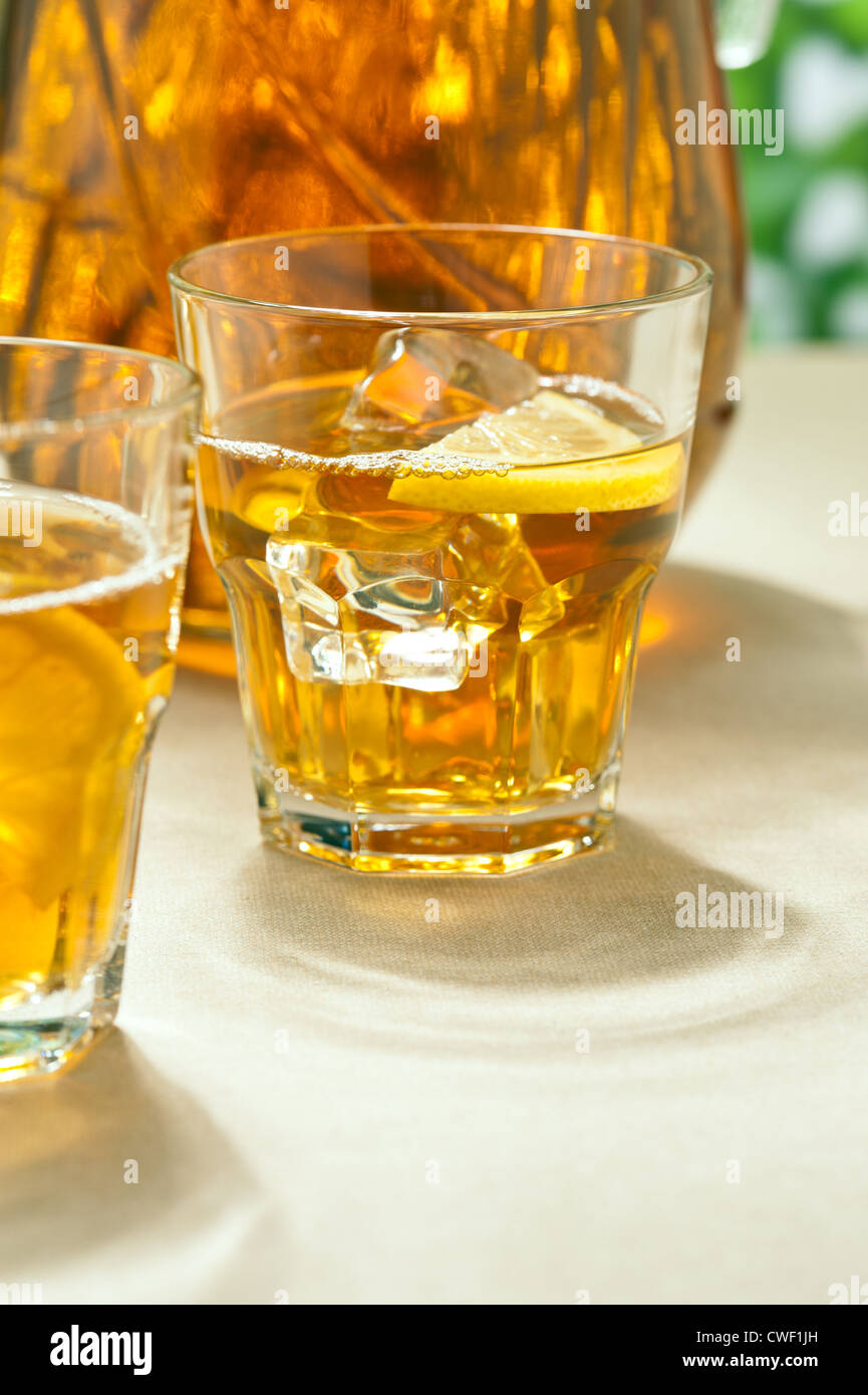 Iced Lemon Ice Tea in on a table in summer Stock Photo - Alamy