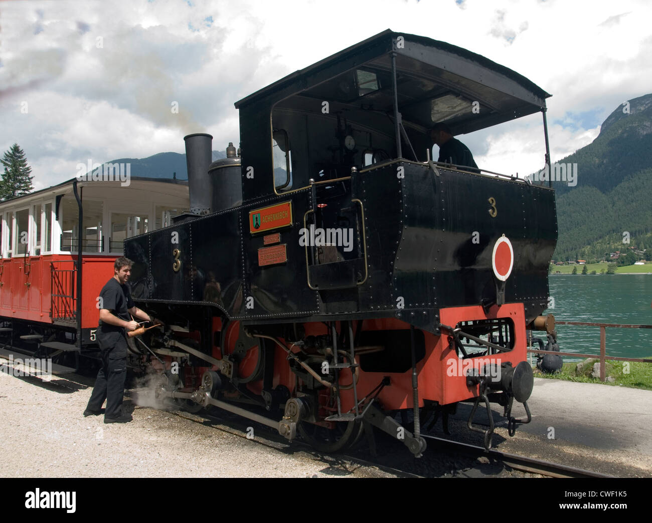 AUSTRIA; TIROL; ACHENSEE STATION. CHECKING THE OIL ON THE RACK AND ...