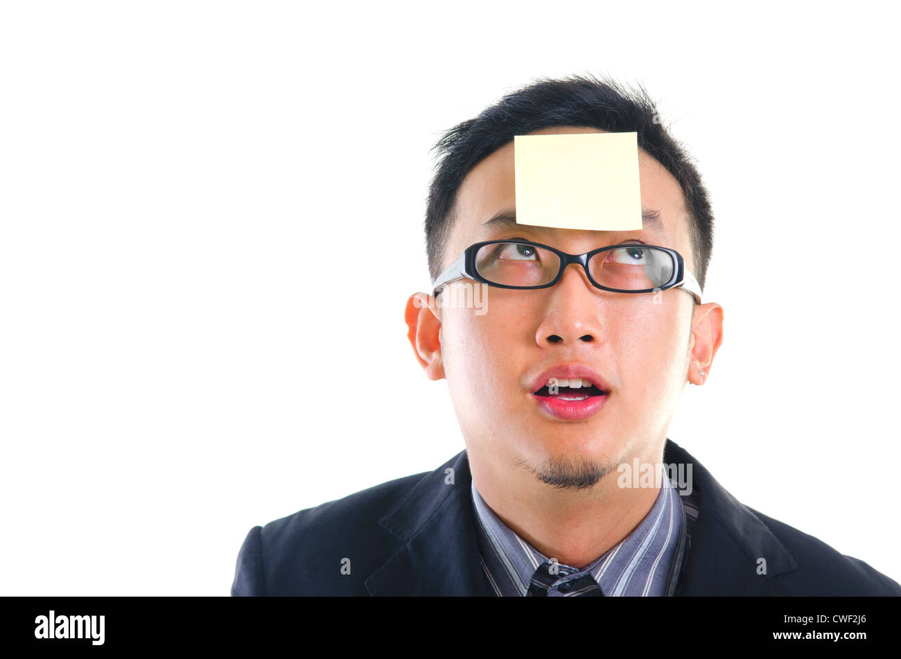asian man with sticky note, confused Stock Photo - Alamy