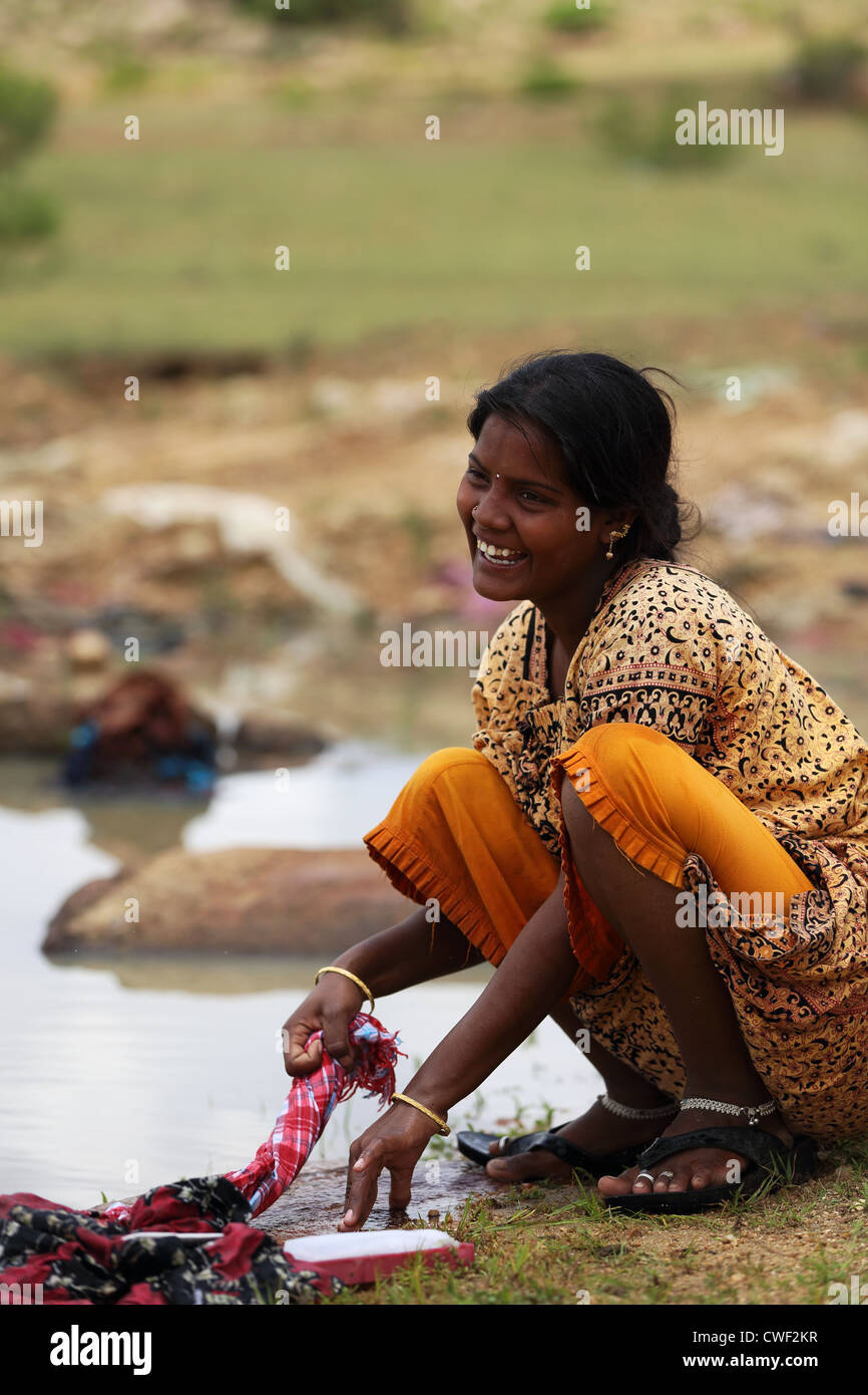 Rural Indian woman doing heir laundry Andhra Pradesh South India Stock ...