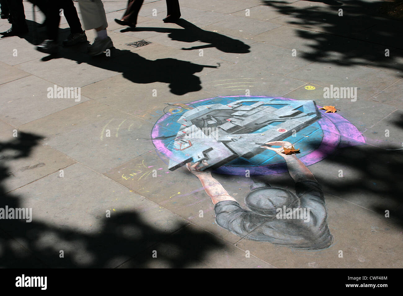 A sidewalk graffiti showing shadows and feet Stock Photo - Alamy