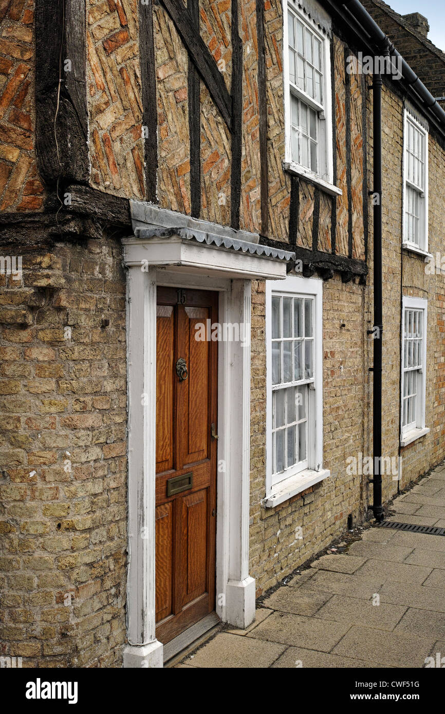 Old terraced house built of brick with timber frame in Waterside Ely ...