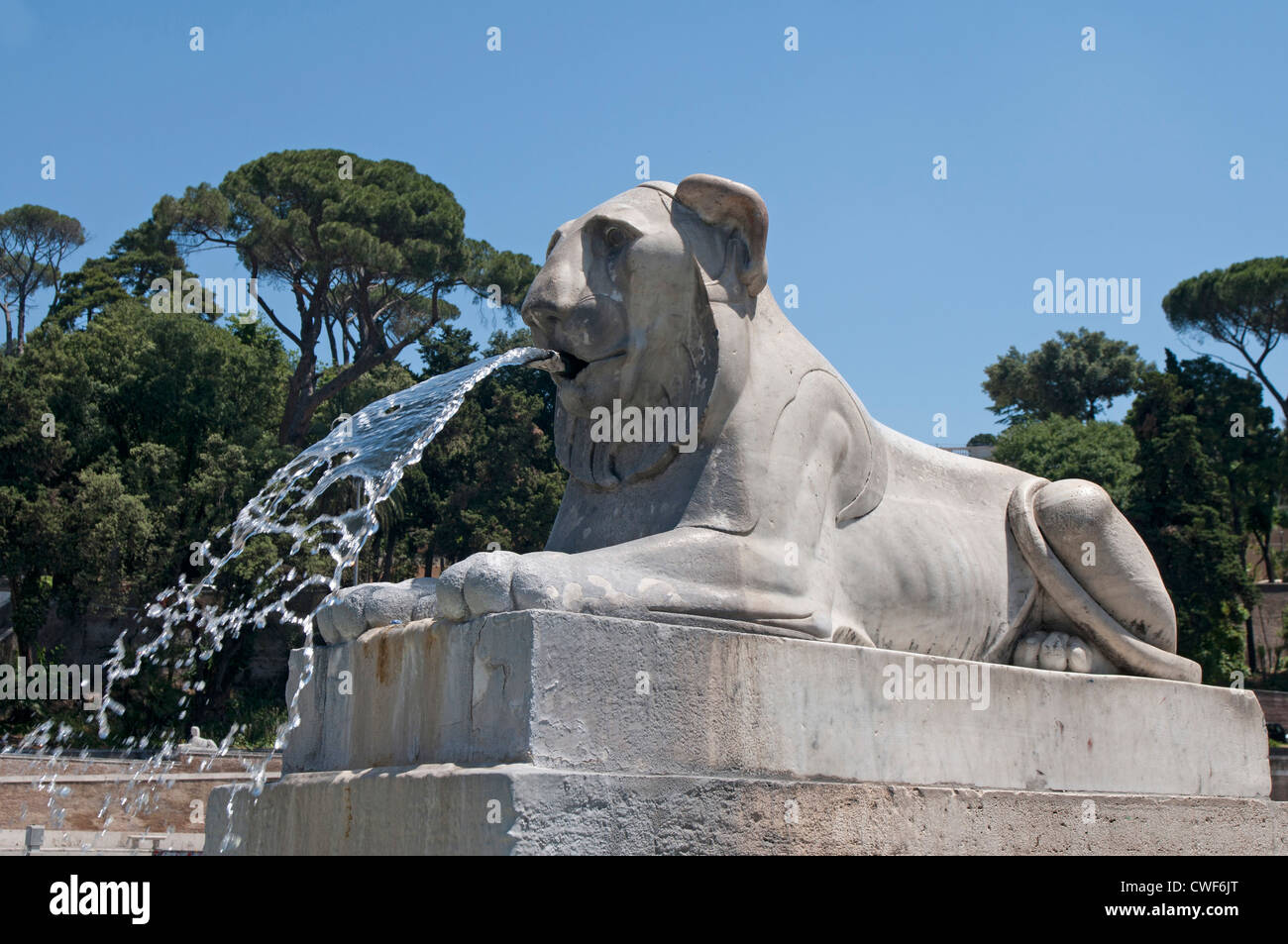Lion Statue spouting water at the foot of The Obelisco Flaminio in the ...