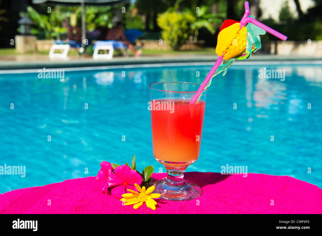 Glass cocktail drink at the luxury outdoor swimming pool Stock Photo ...