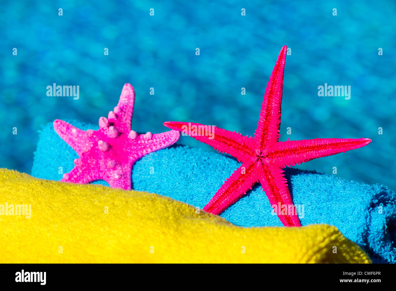 Starfish and towels near the swimming pool Stock Photo - Alamy