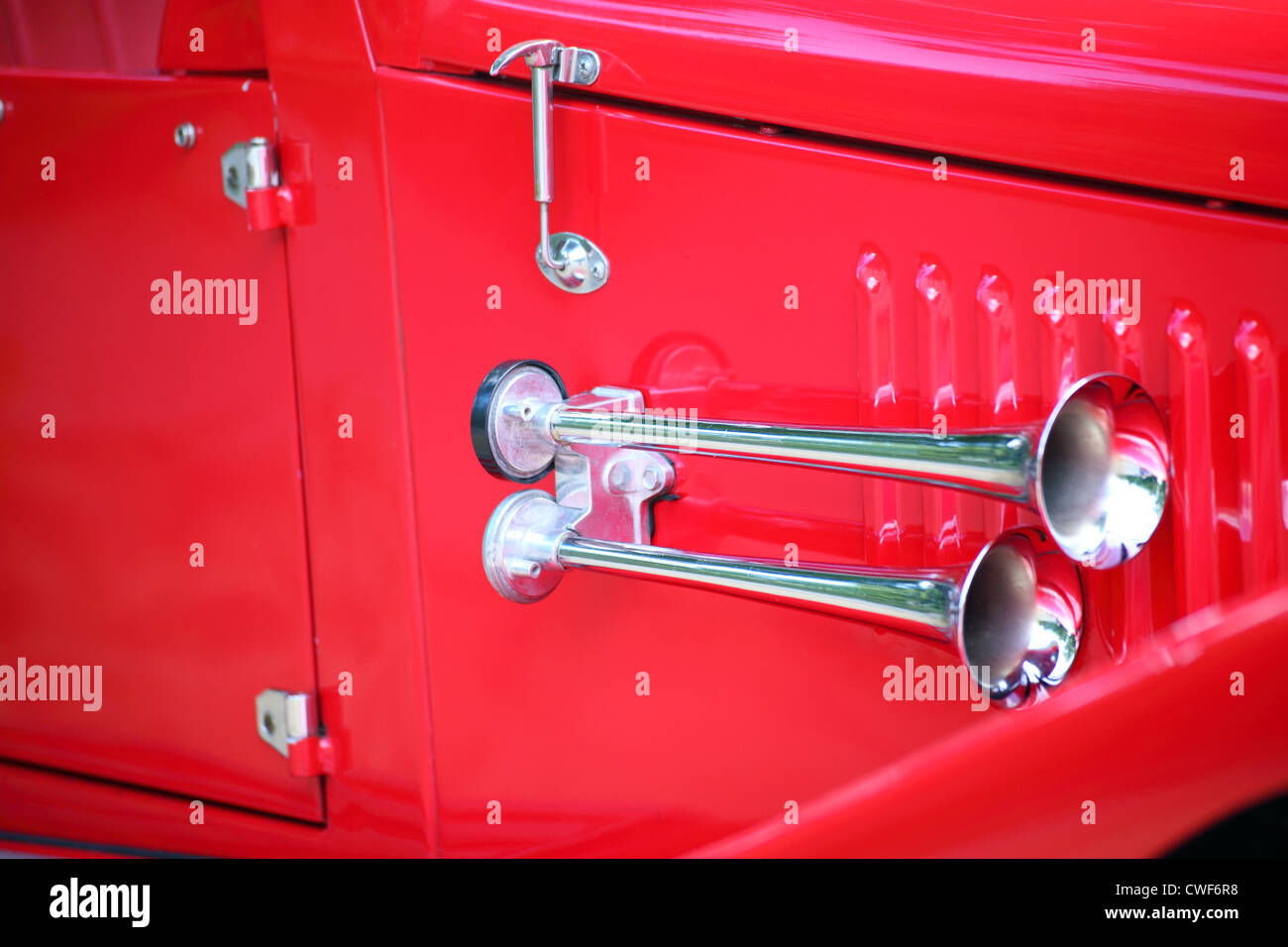 cropped image of a fully restored classic old car with lots of shiny ...