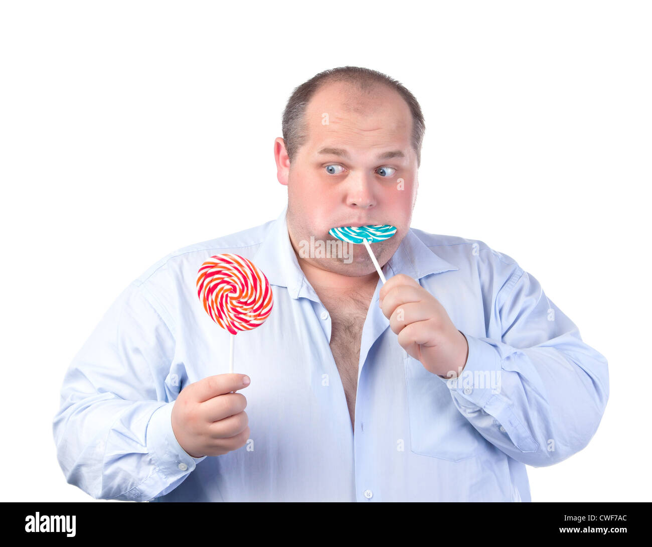 Fat Man in a Blue Shirt, Eating a Lollipop, isolated Stock Photo - Alamy