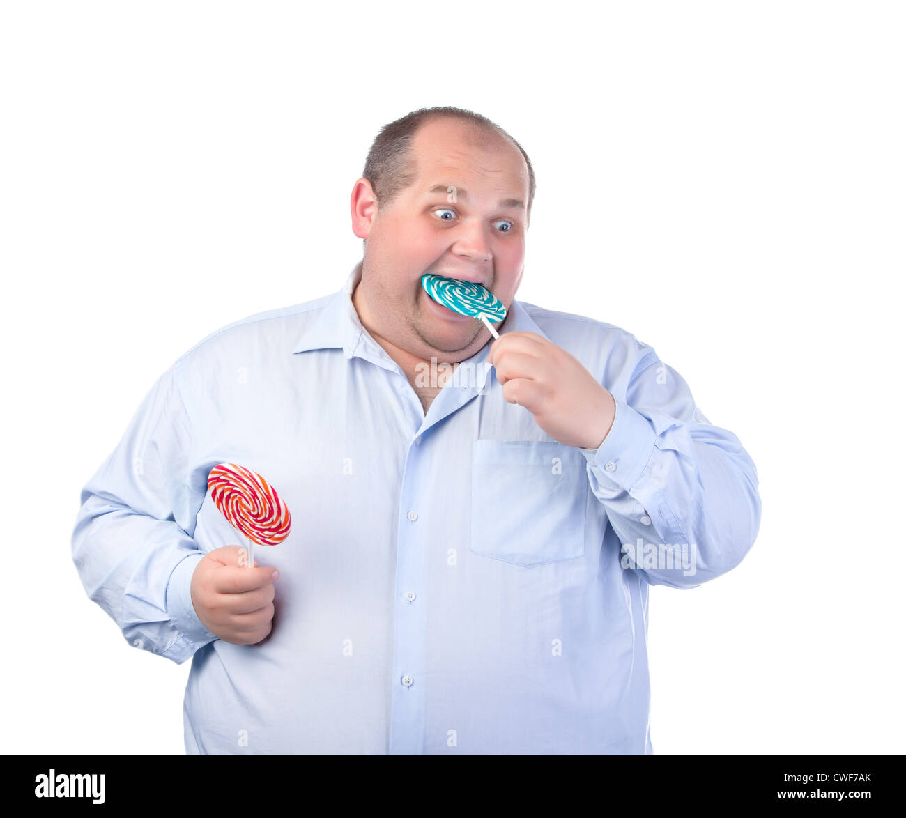 Fat Man in a Blue Shirt, Eating a Lollipop, isolated Stock Photo - Alamy