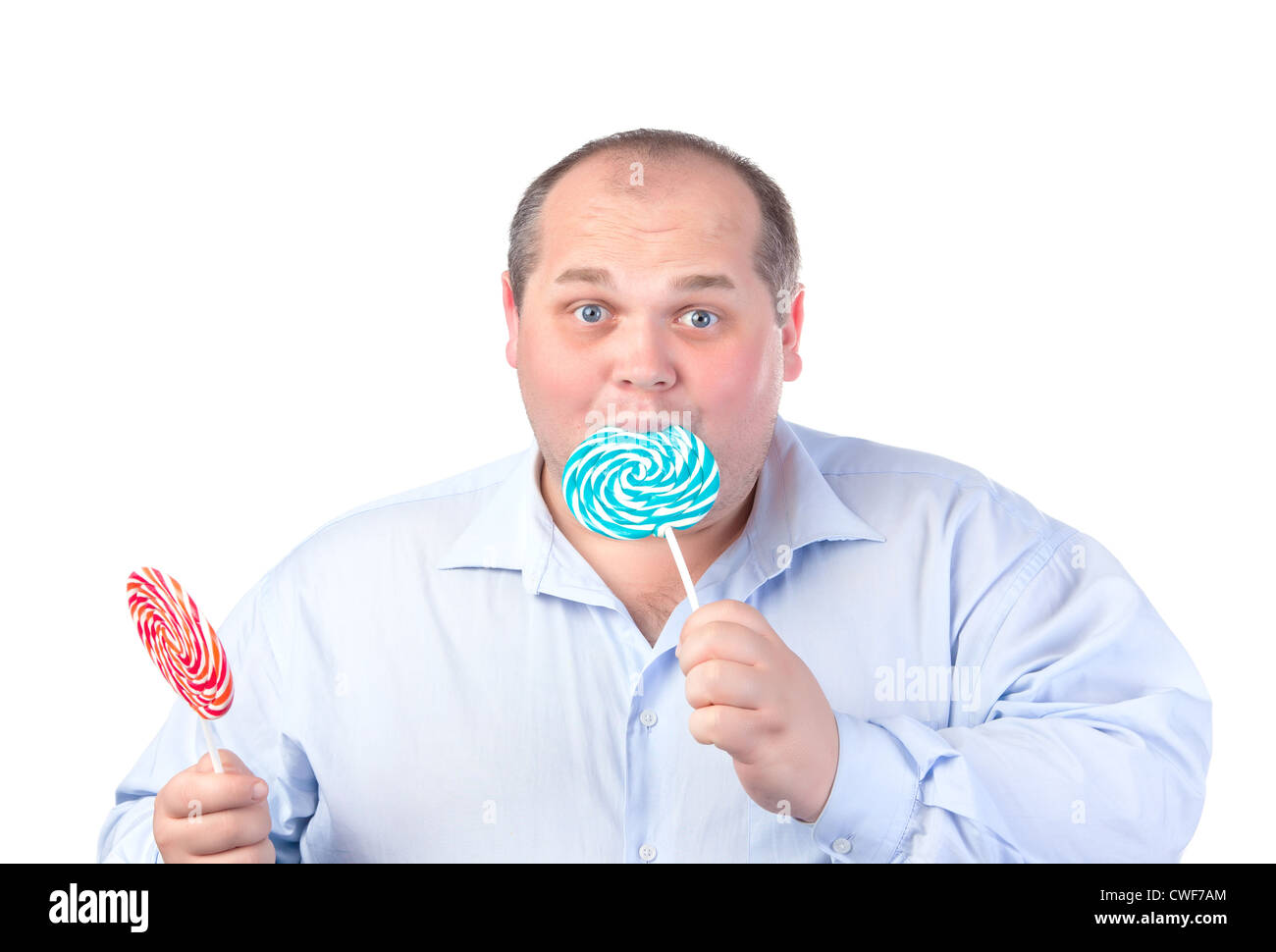 Fat Man in a Blue Shirt, Eating a Lollipop, isolated Stock Photo - Alamy