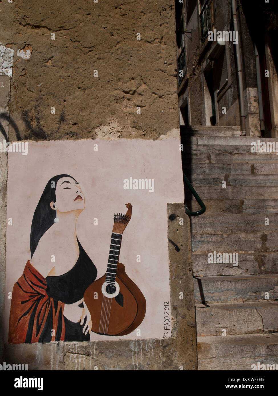 Fado singer graffiti in Lisbon street Stock Photo - Alamy